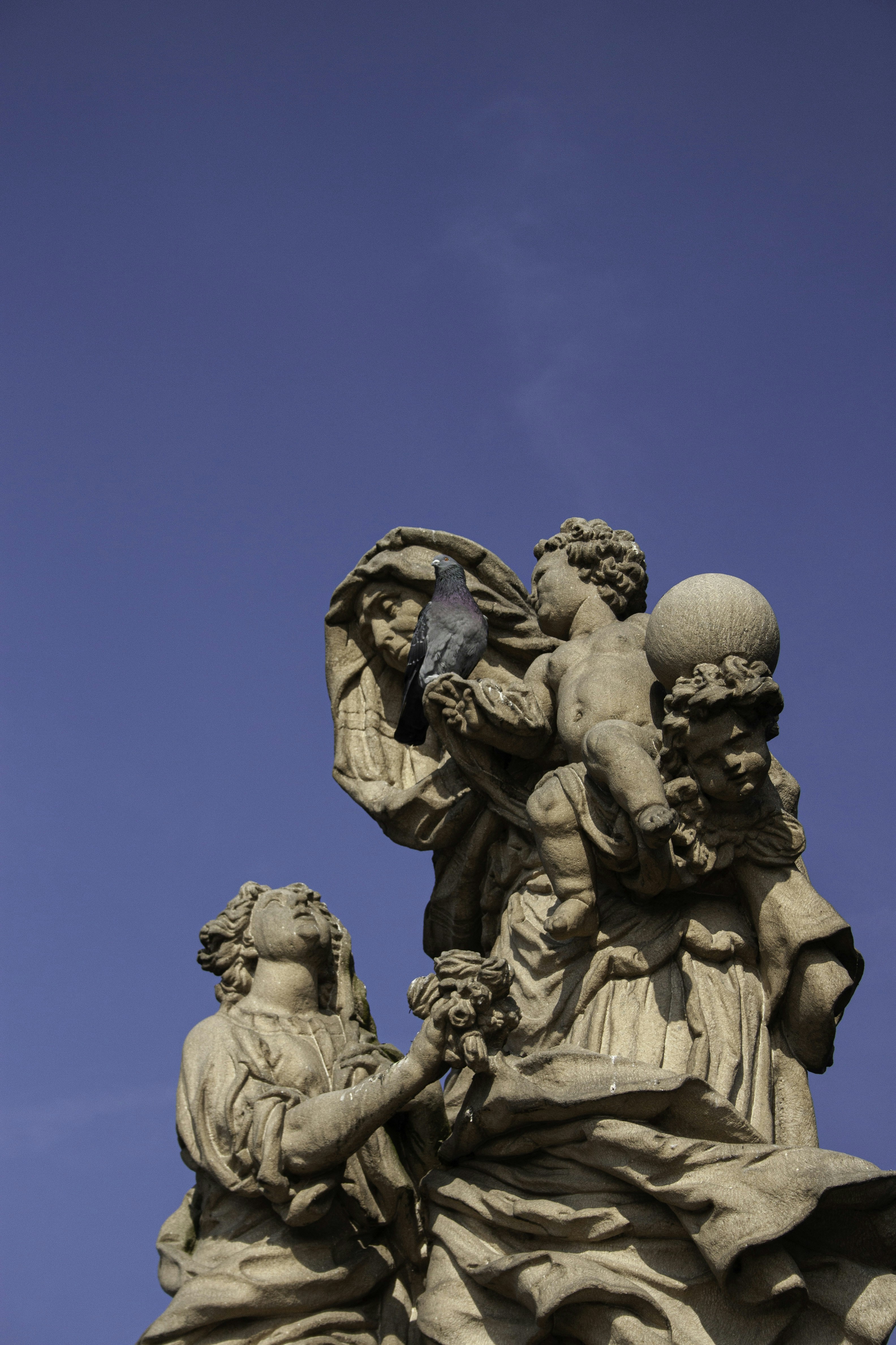 Sculpted Revelry: A Classical Group in Clear Sky