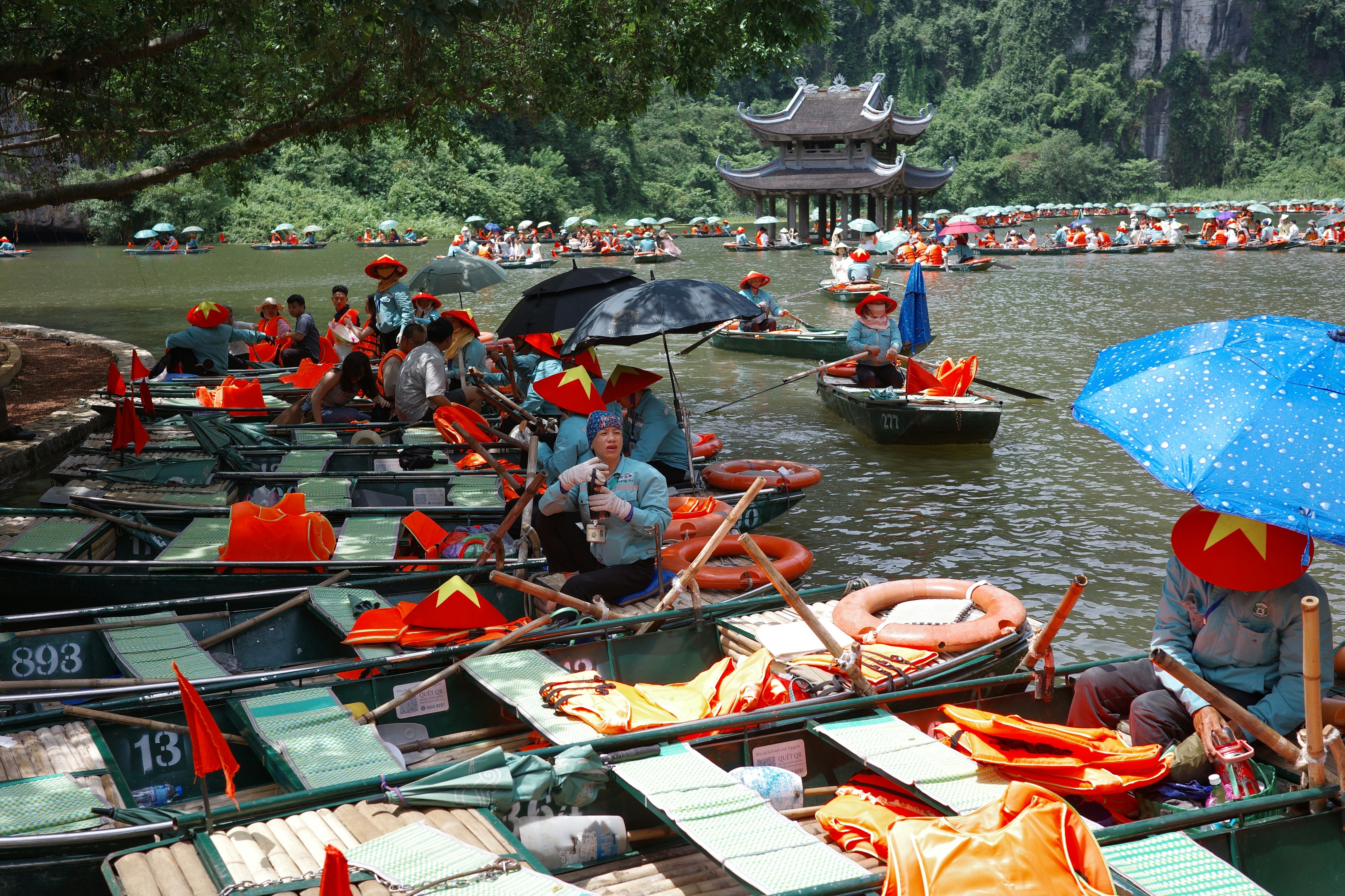 Floating Lanterns and Rowboats: A Crowd at the Temple Lake