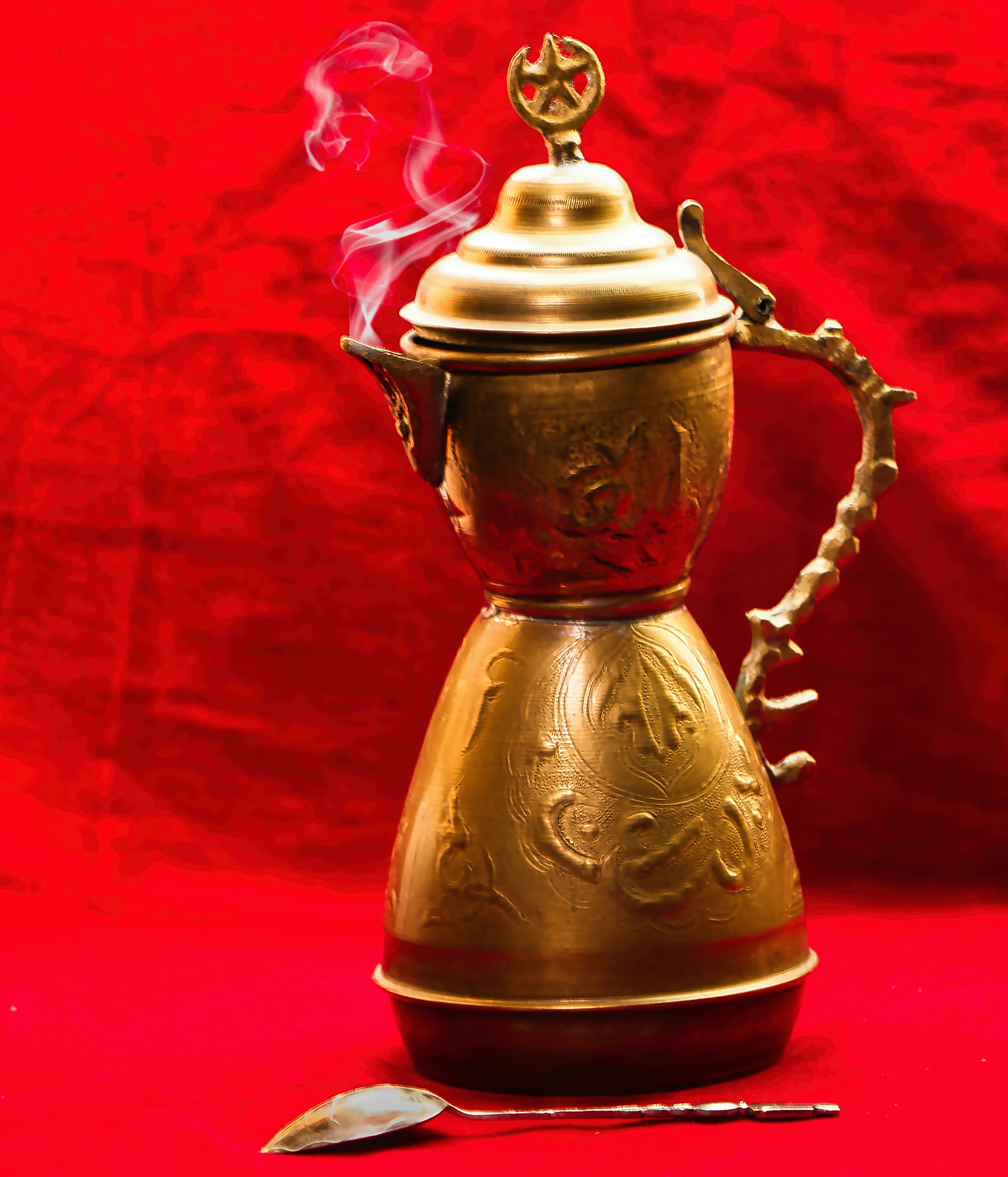 Ember-Red Ewer: A Golden Turk’s Coffee Urn Aflame with Steam