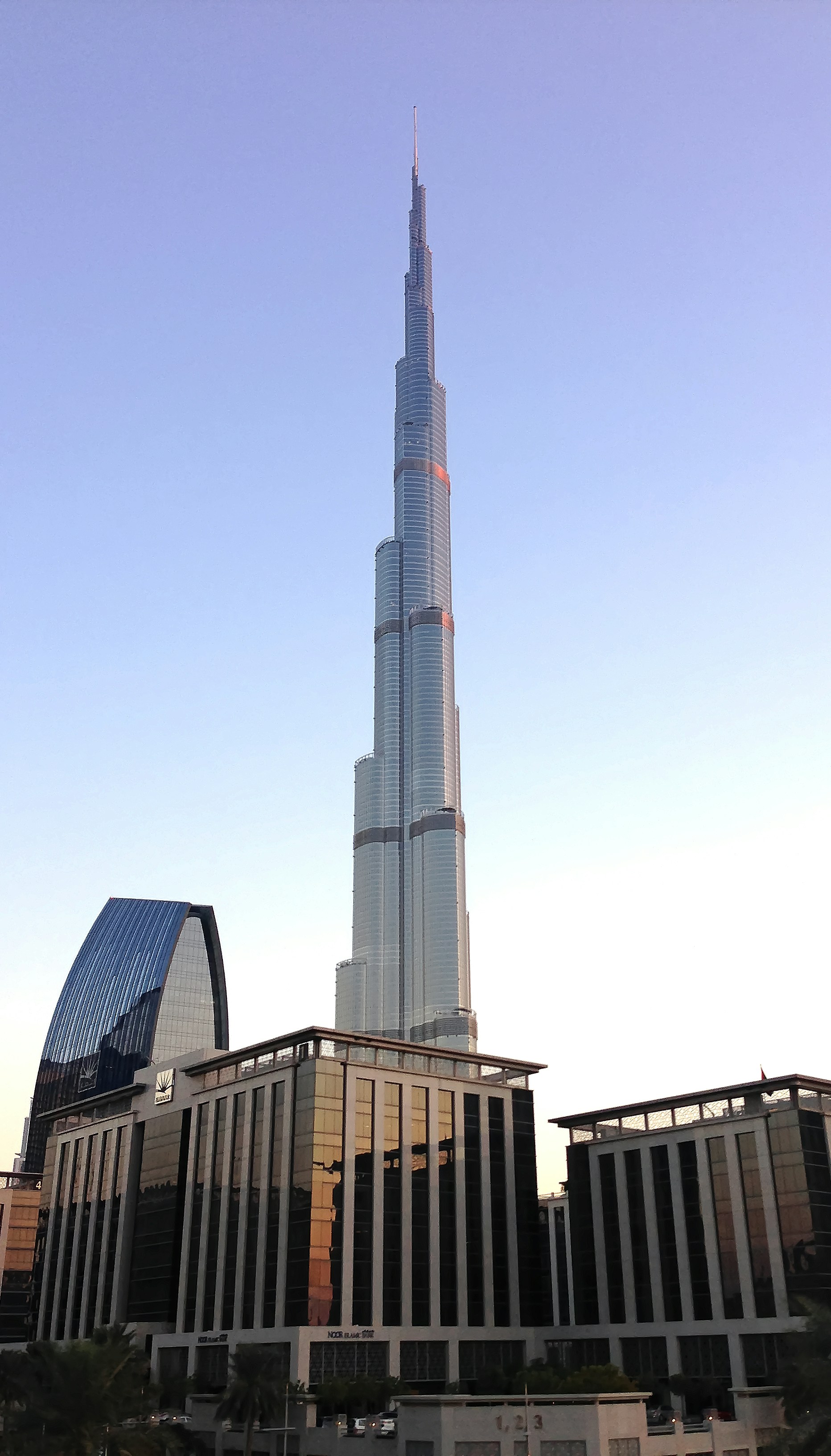 Burj Khalifa Ascending: Glass Spire Over a Maritime Cityscape