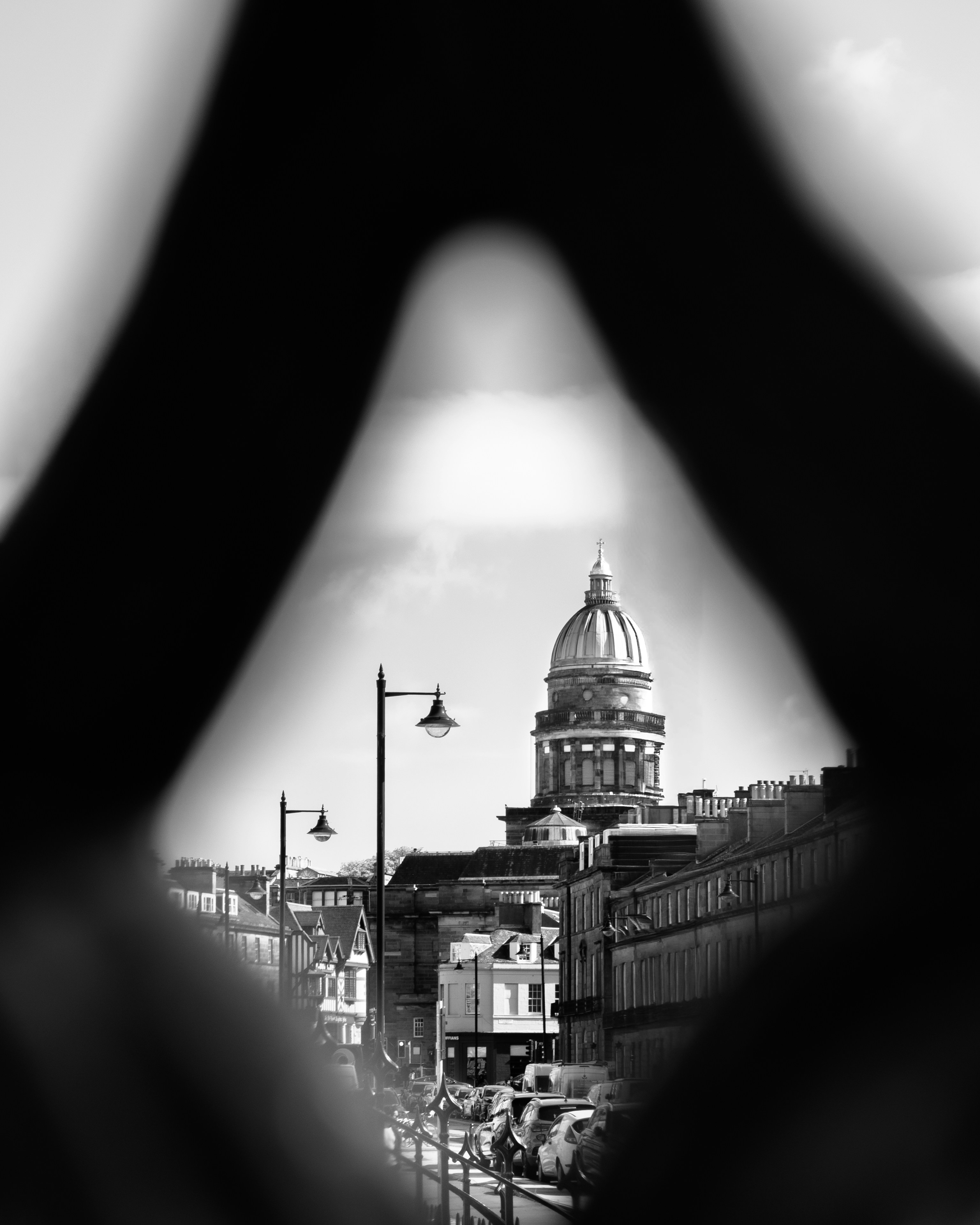 City Dome Framed by Arch of Darkness