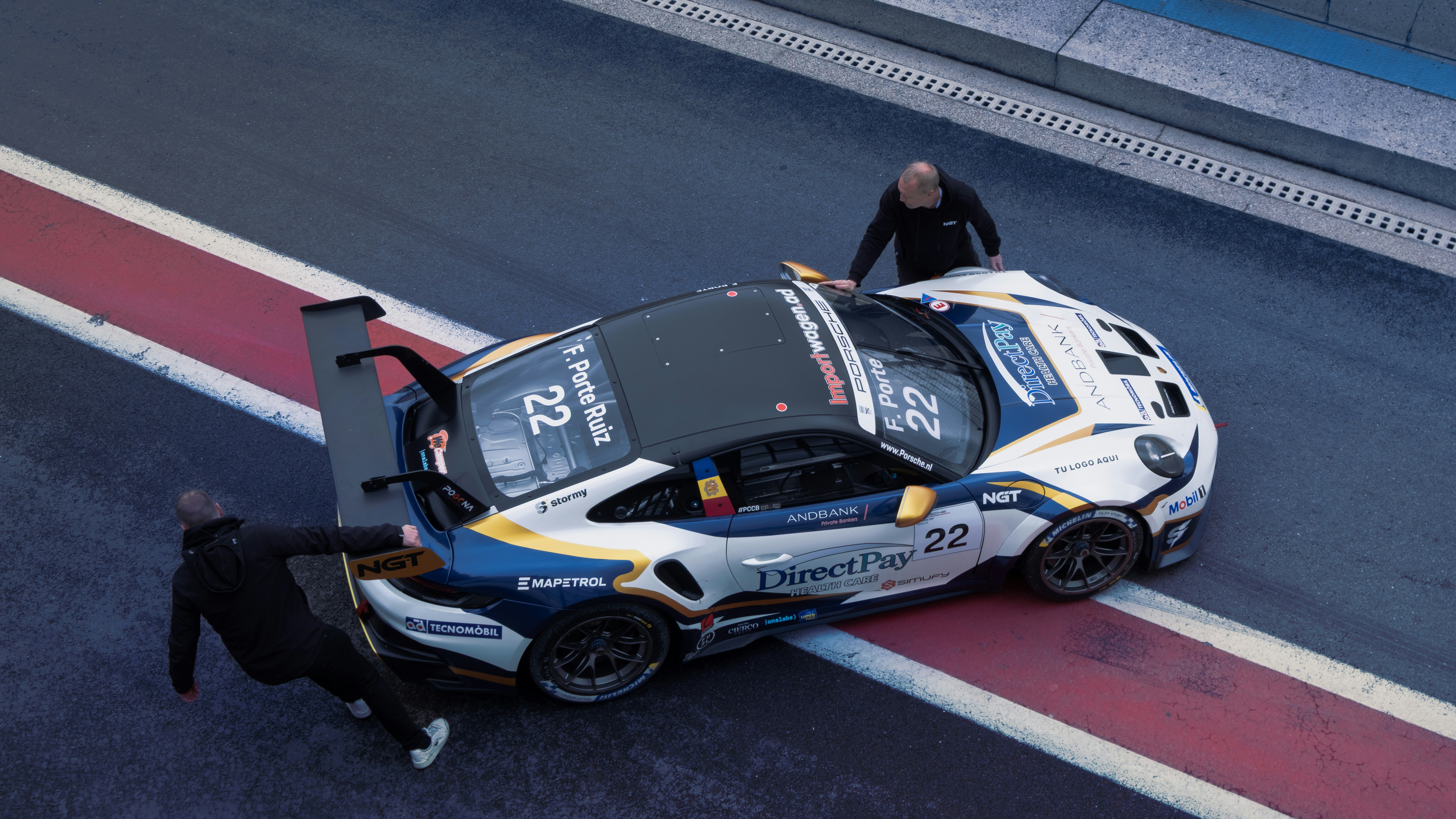 Pit Stop Precision: The Racing Car Reaches the Red Stripe