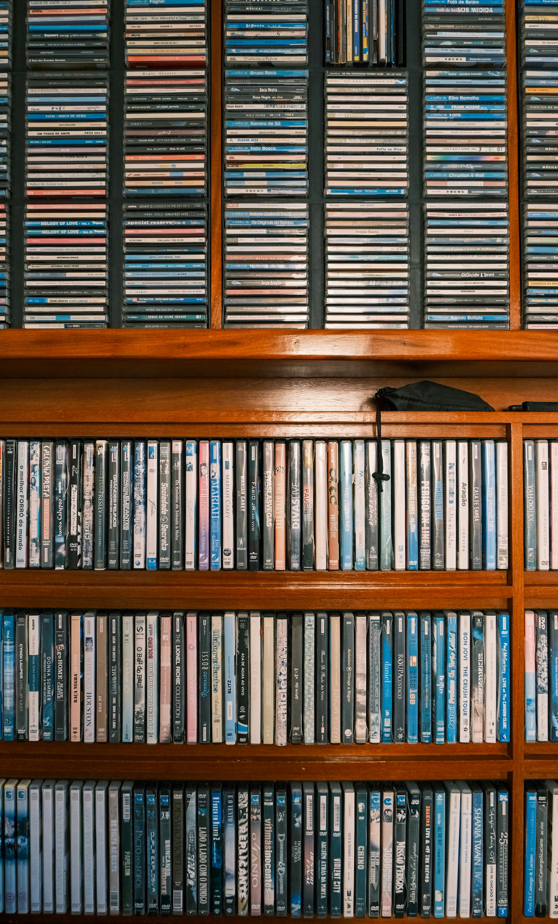 Shelved Echoes: A Tidal Wave of Compact Discs