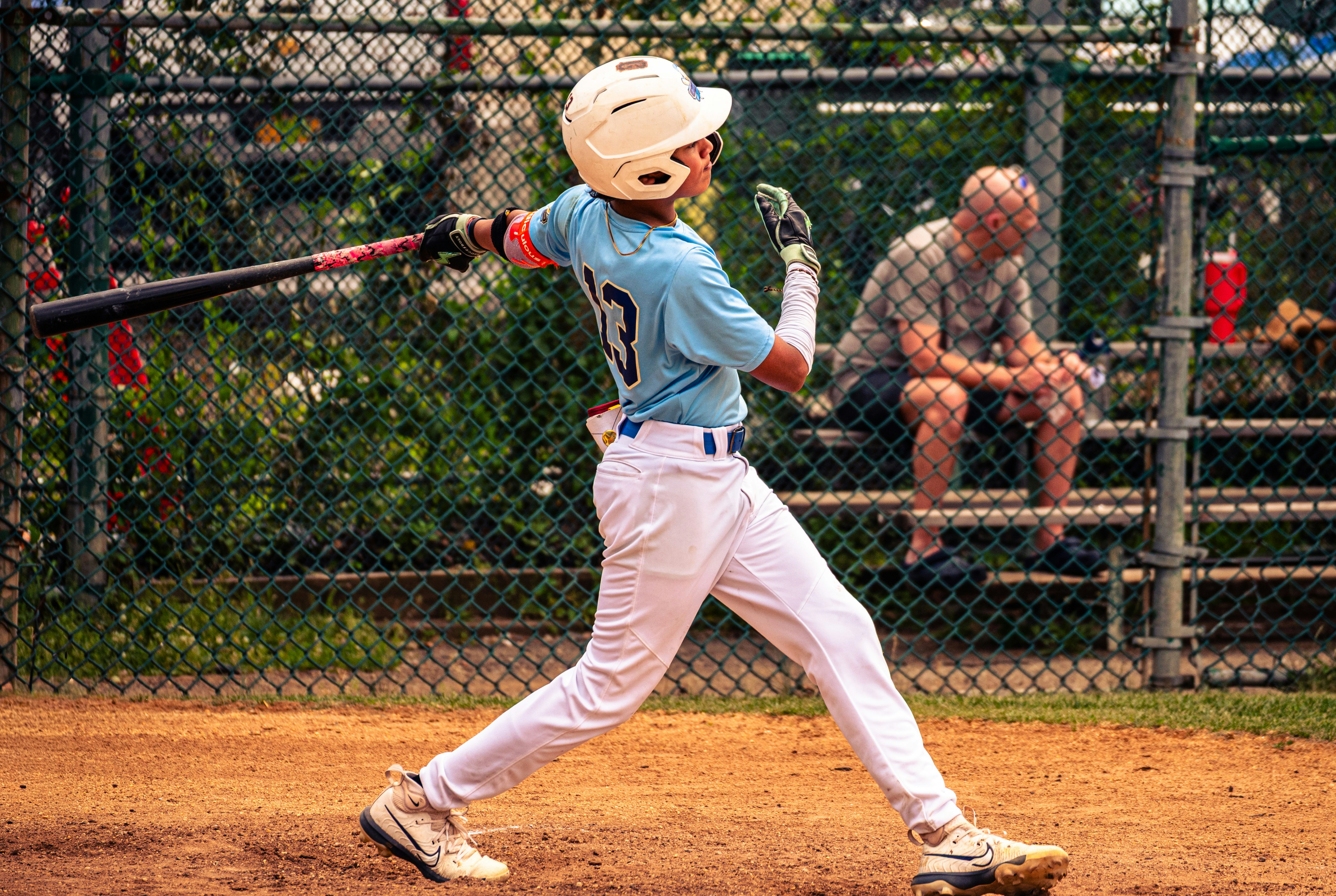 Youth Baseball Swing: Stride and Power on the Dirt