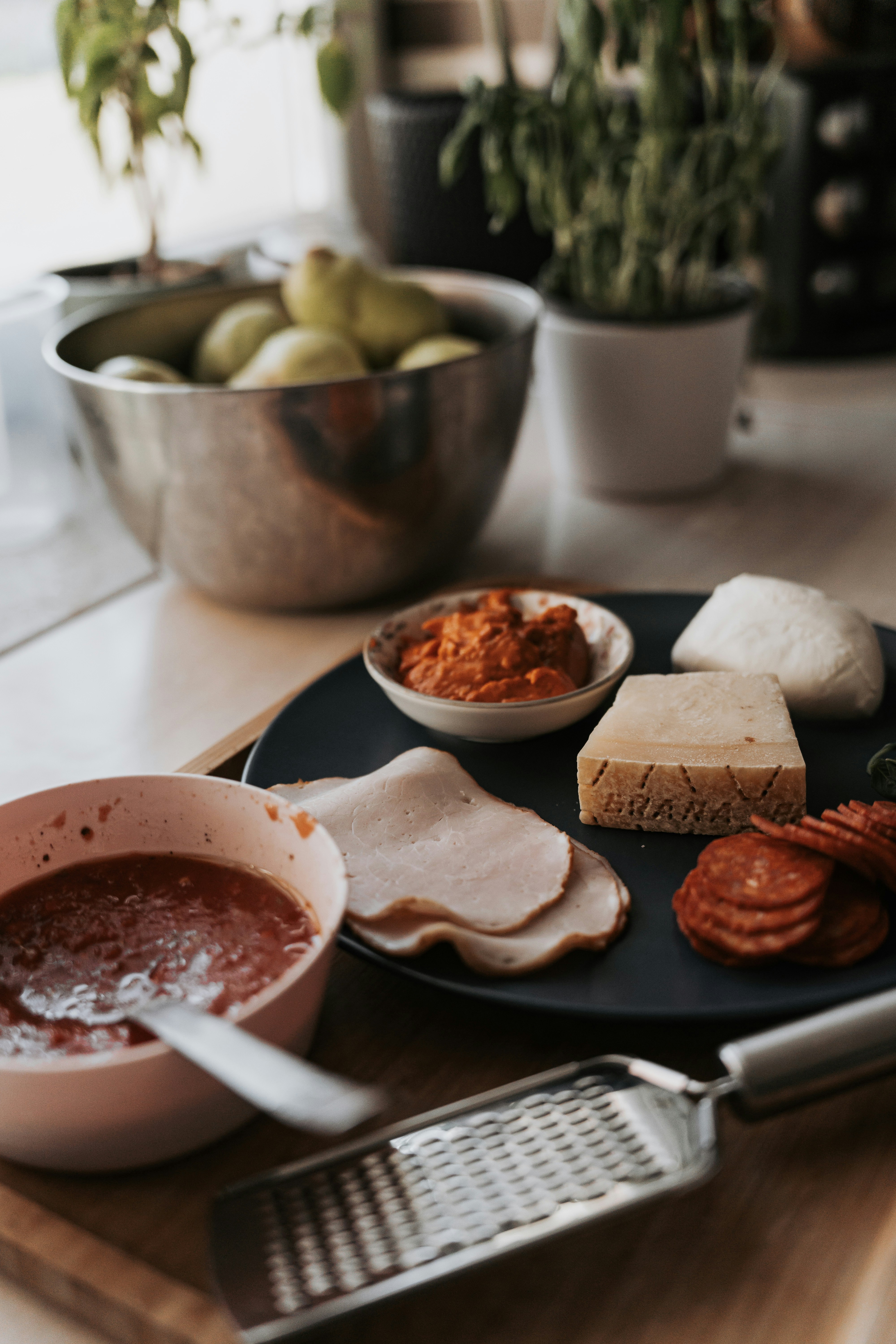 Charcuterie Cue: A Rustic Board with Focus on Cheese and Spread