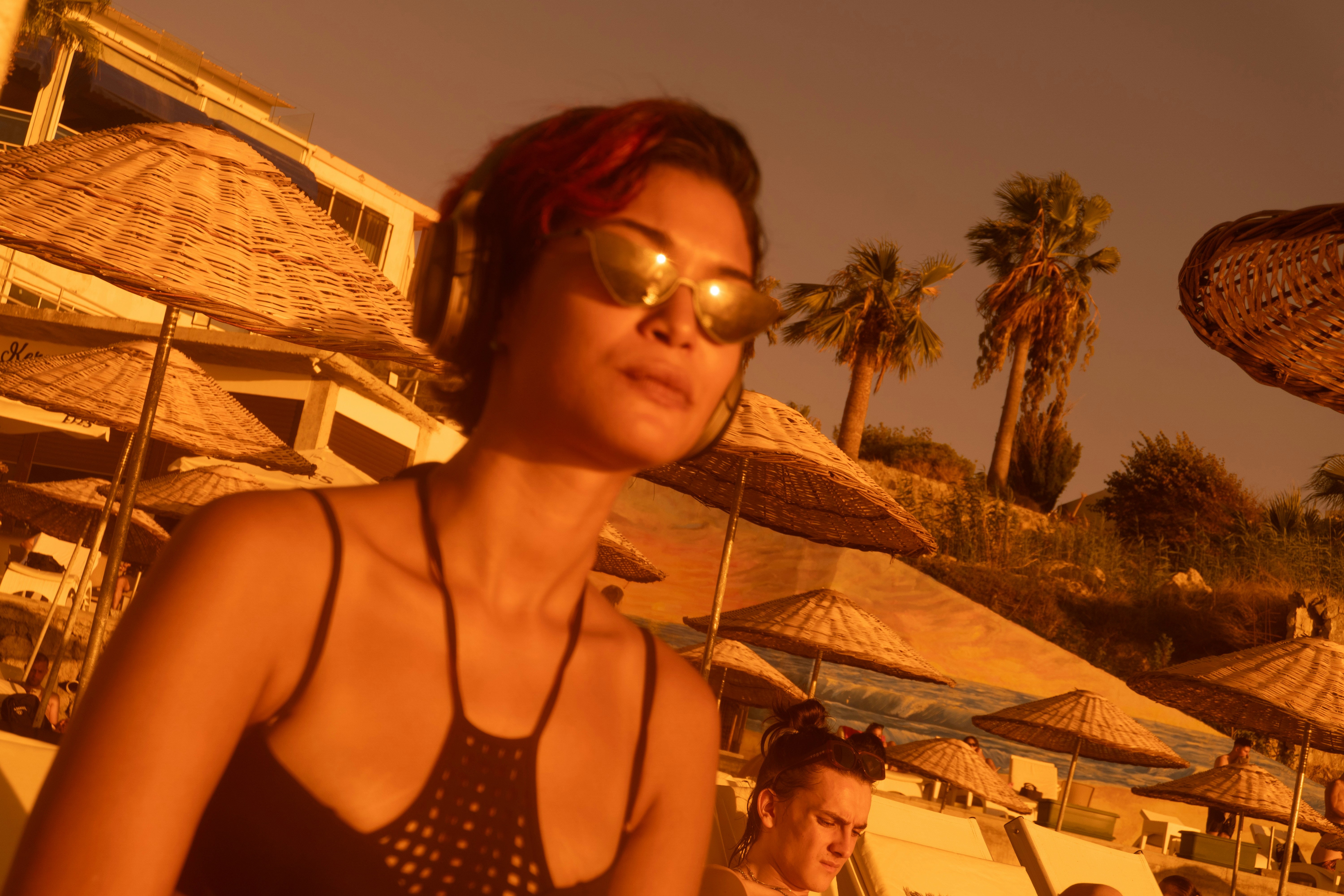 Sunlit Confidence: A Beachside Moment in Warm Glow