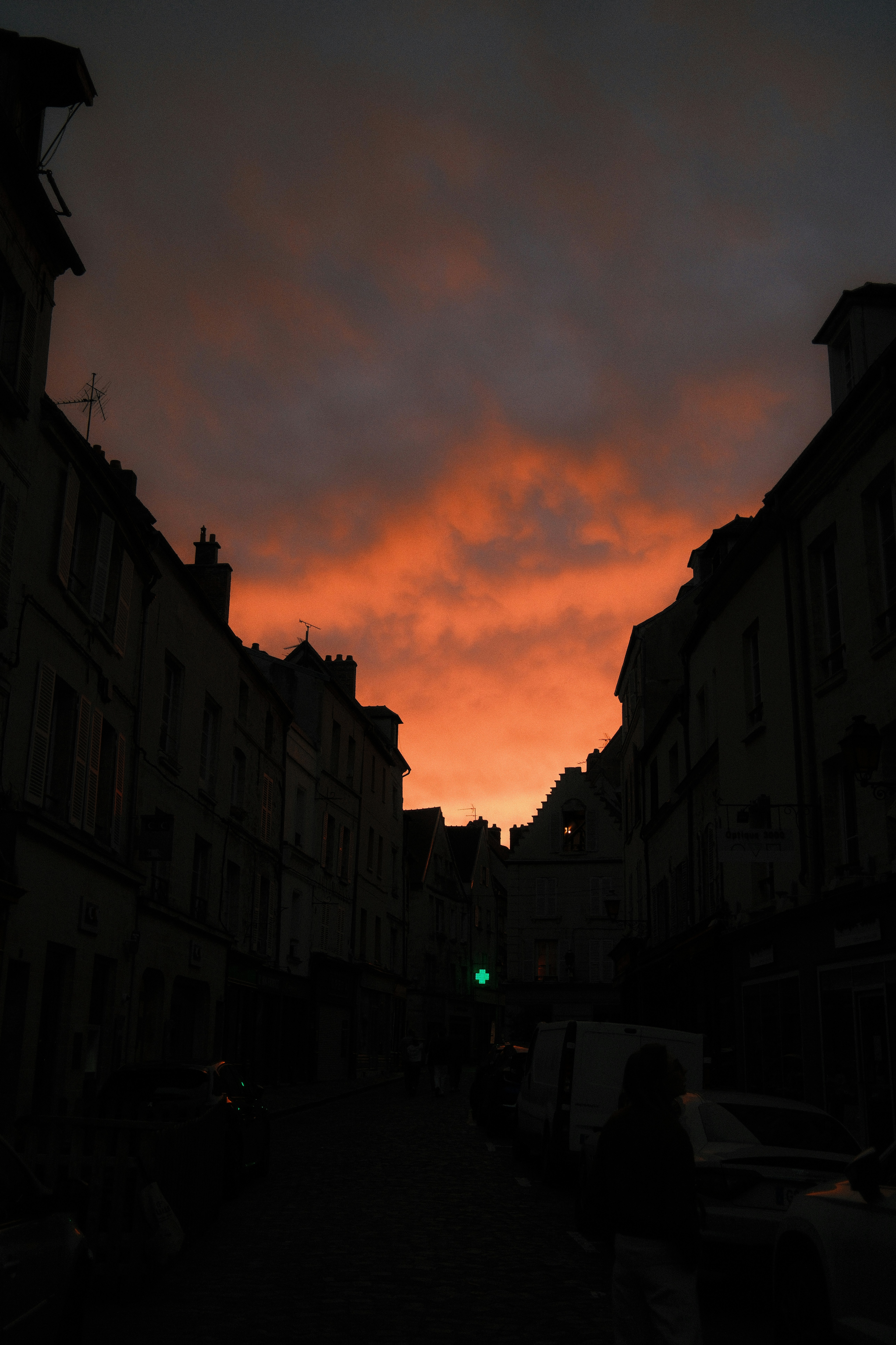 Crimson Sky Over Quiet Calle