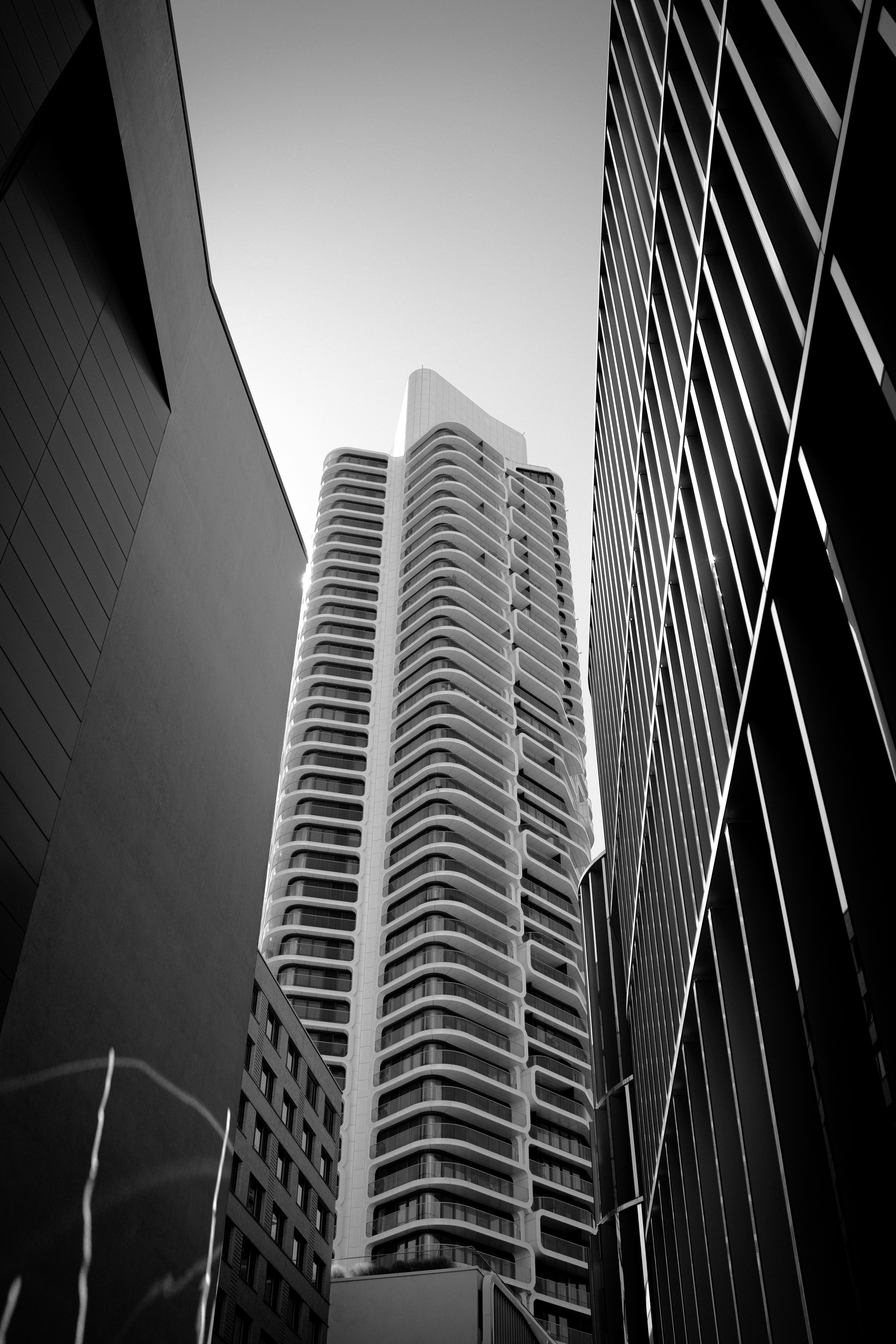 Monolith Between Glass: A Vertical City Portrait
