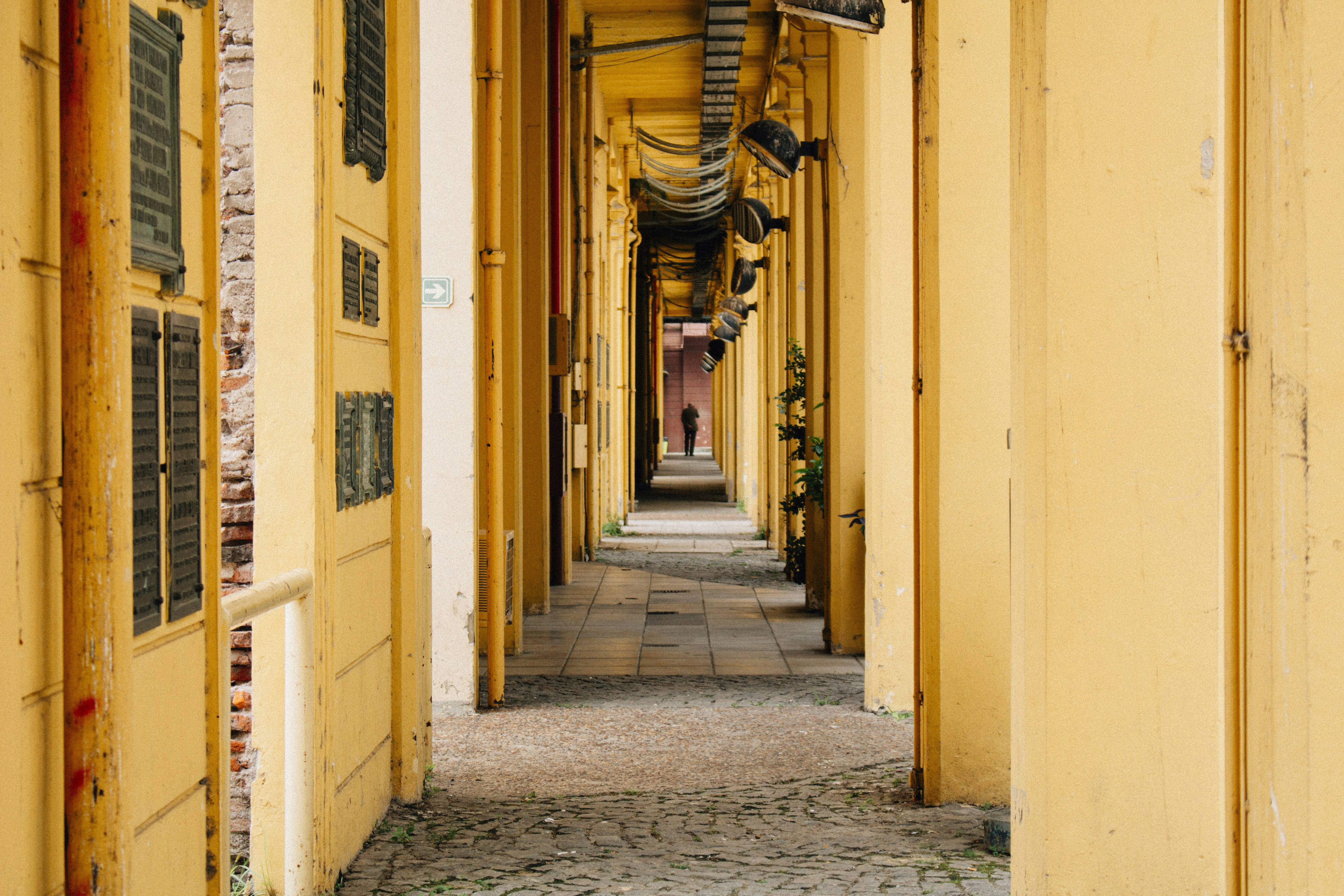 Golden Corridor: A Sunlit Alley Reaching Toward the Distance