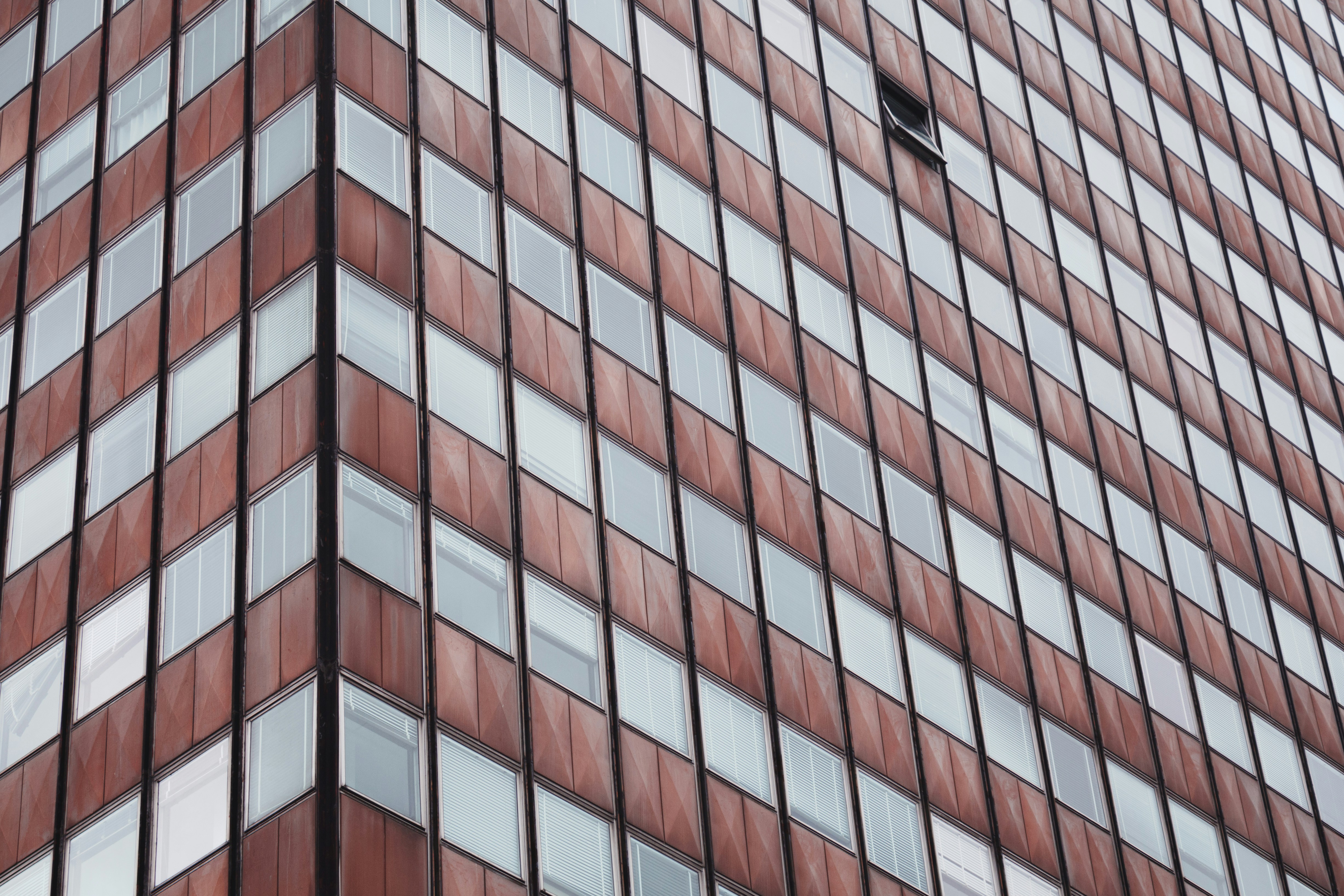 Grid of Red Facades: A Modern Geometric Facade Closeup