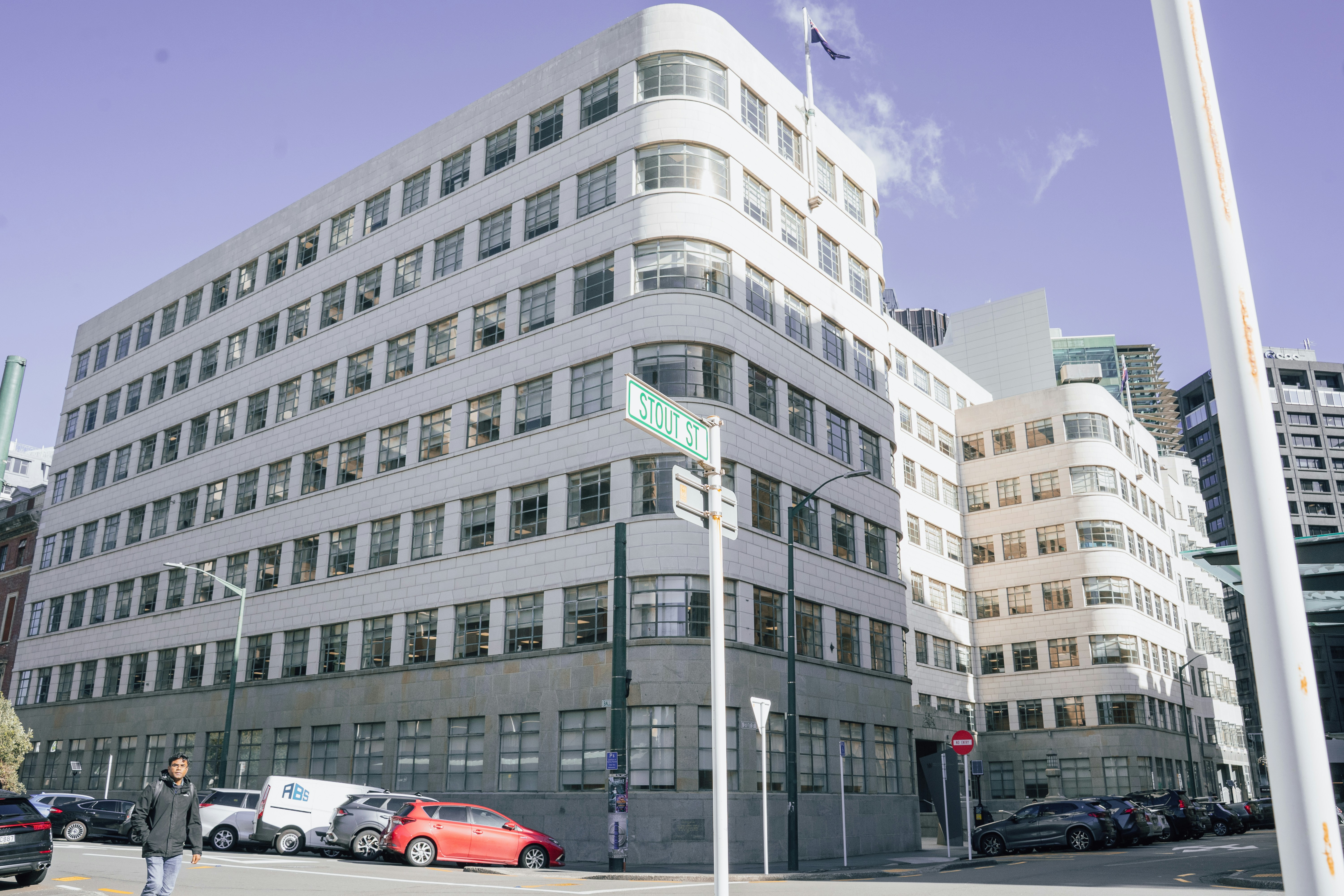 Curved Retro Facade under a Clear Noon Sky