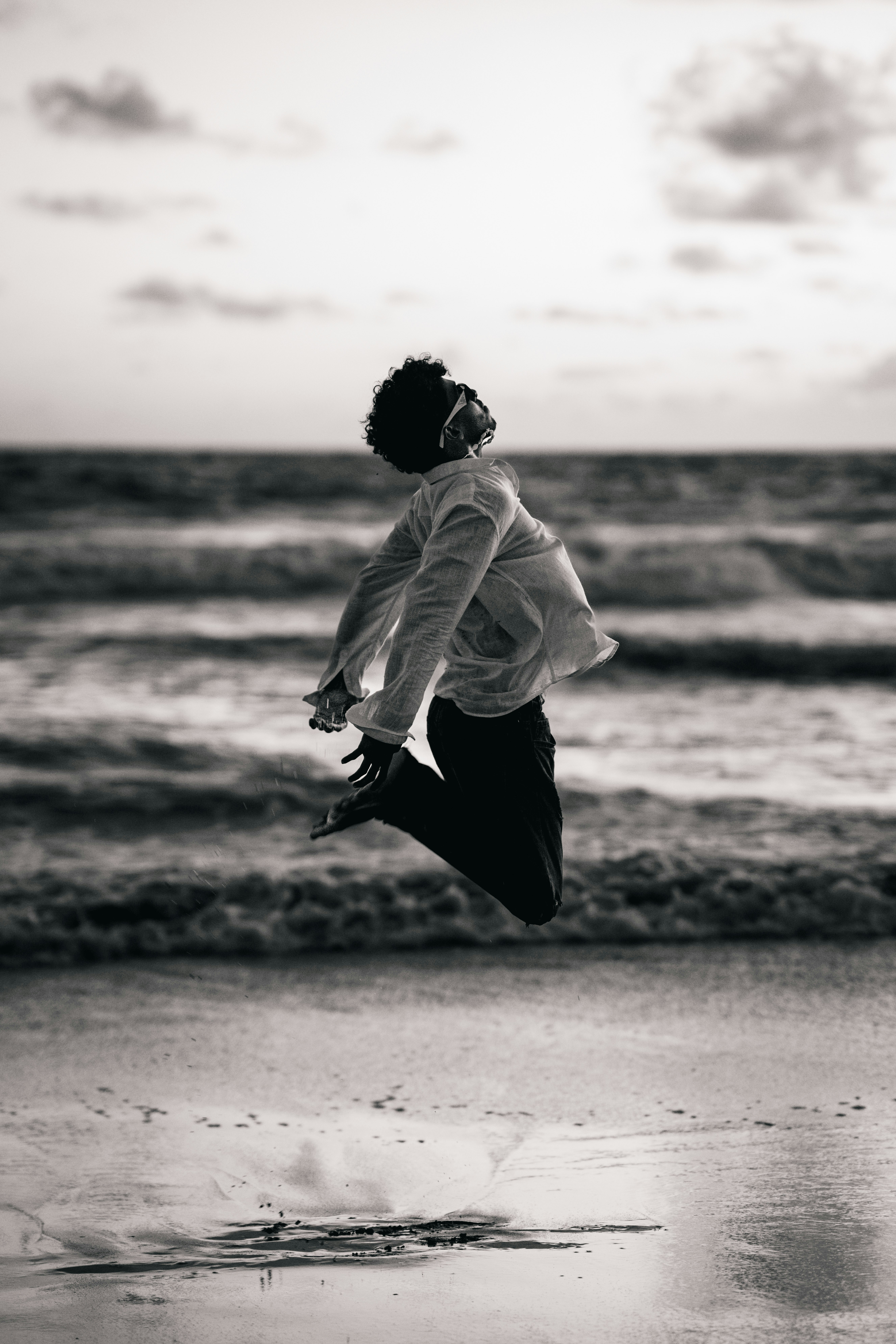 Leap of Light: A Silhouette in Silent Sea Breeze
