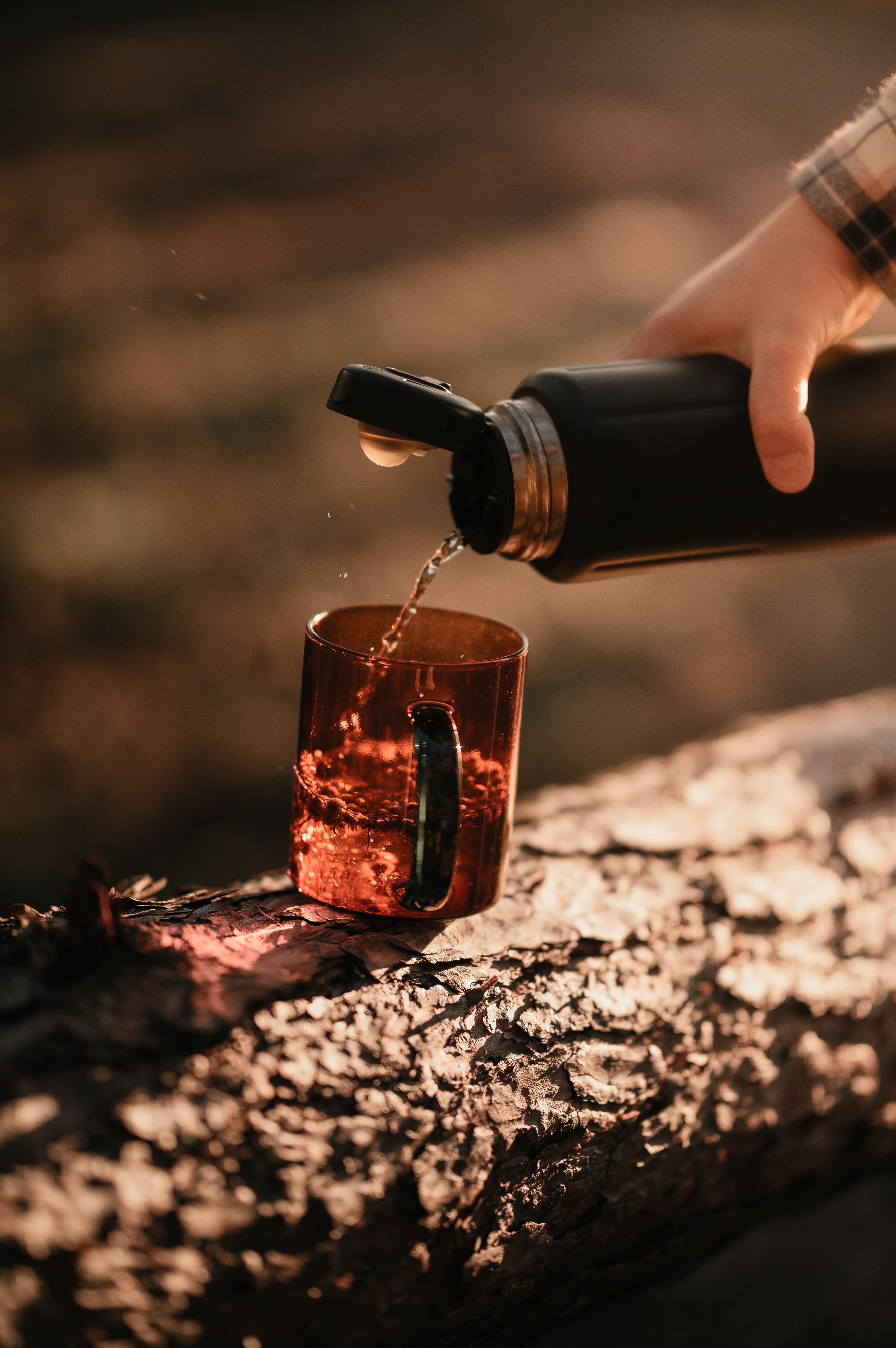 Pouring Warmth: A Copper Mug Captured in Quiet Moment