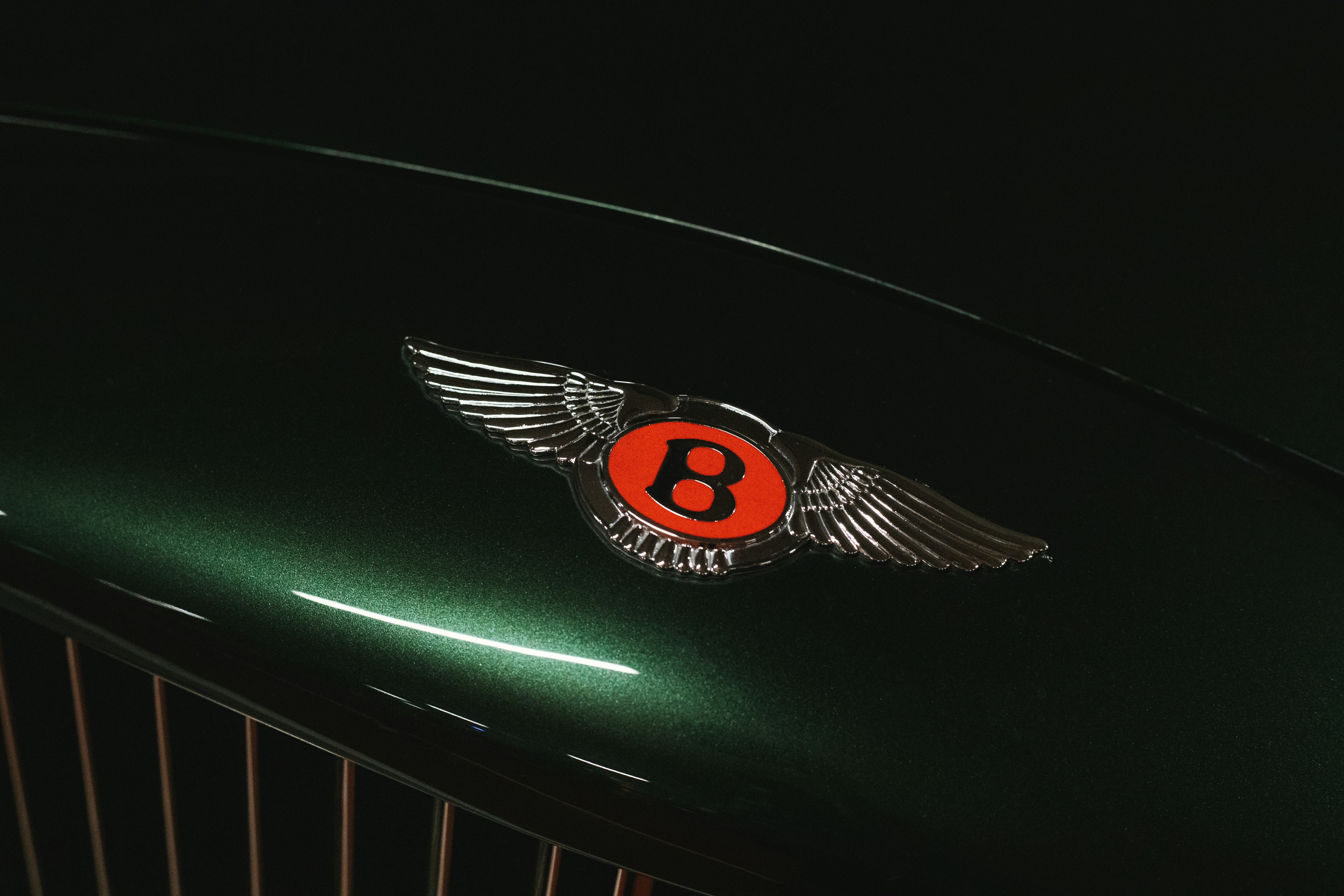 Emerald Crest: Bentley Emblem on Dark Green Hood