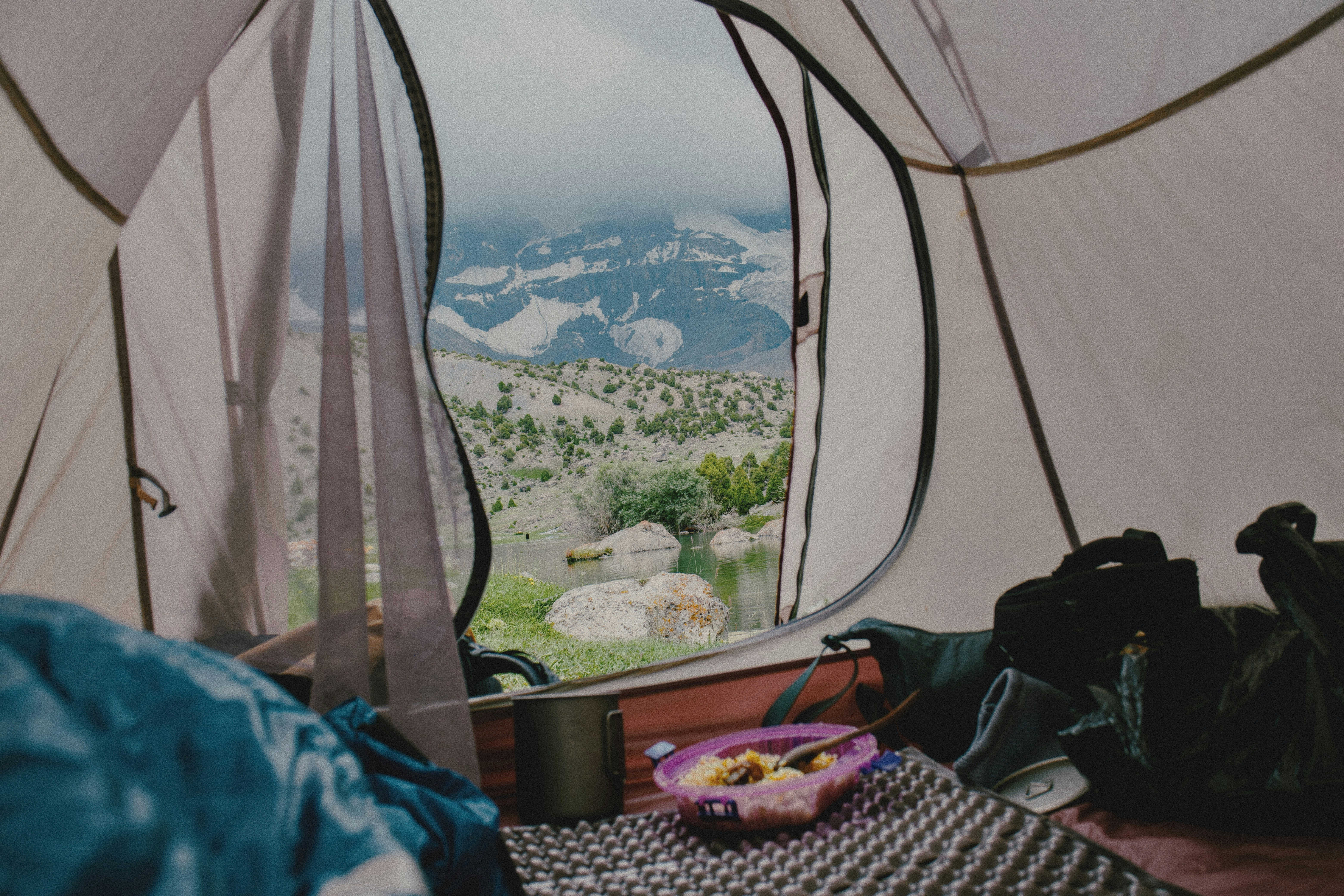 Through a Tent Window: Alpine Vista Emerges from the Camp Loft