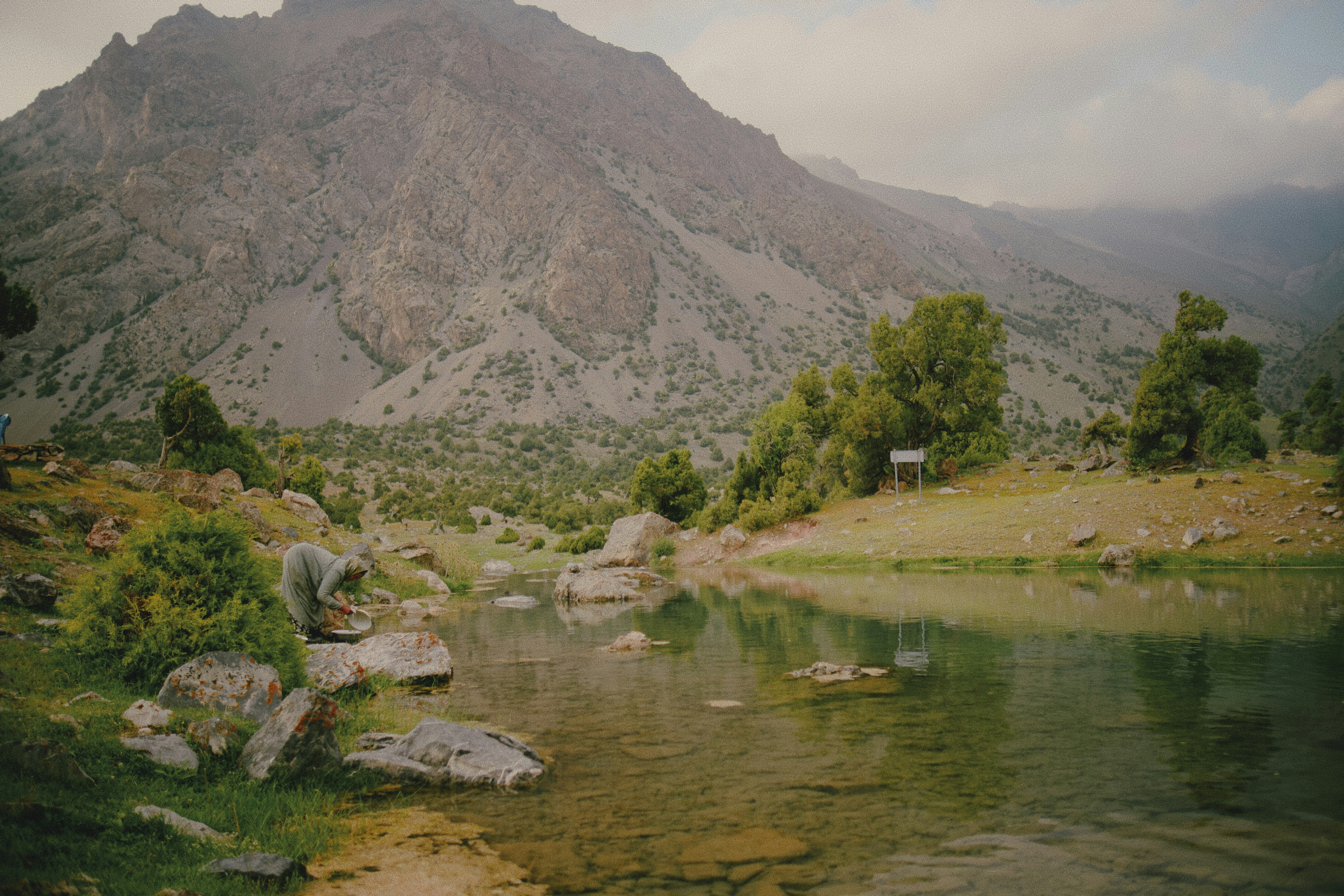 Stillness by the Lake Beneath a Rugged Summit