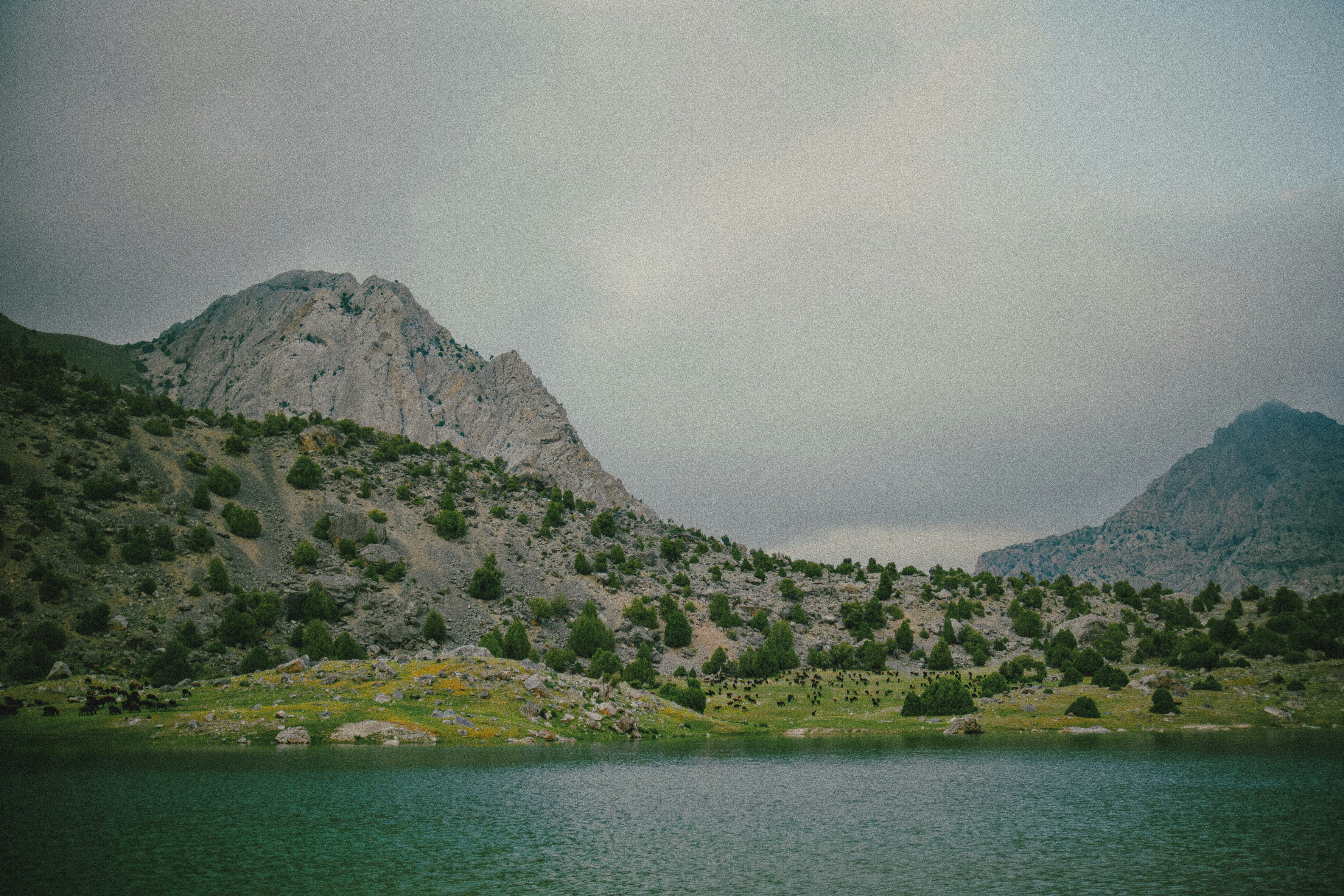 Emerald Lake Between Rugged Peaks at Dusk