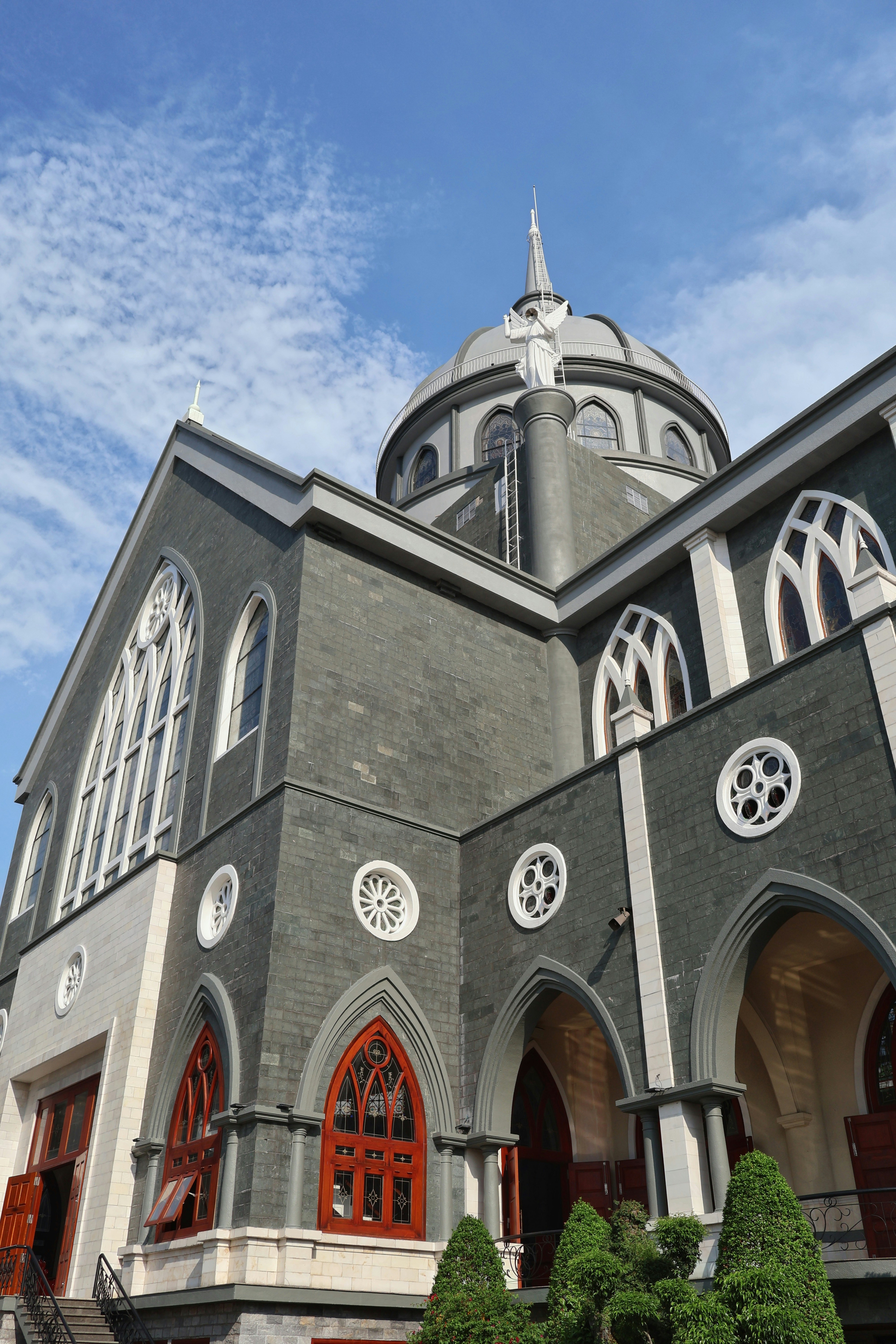 Gothic Revival Facade Under a Bright Blue Sky