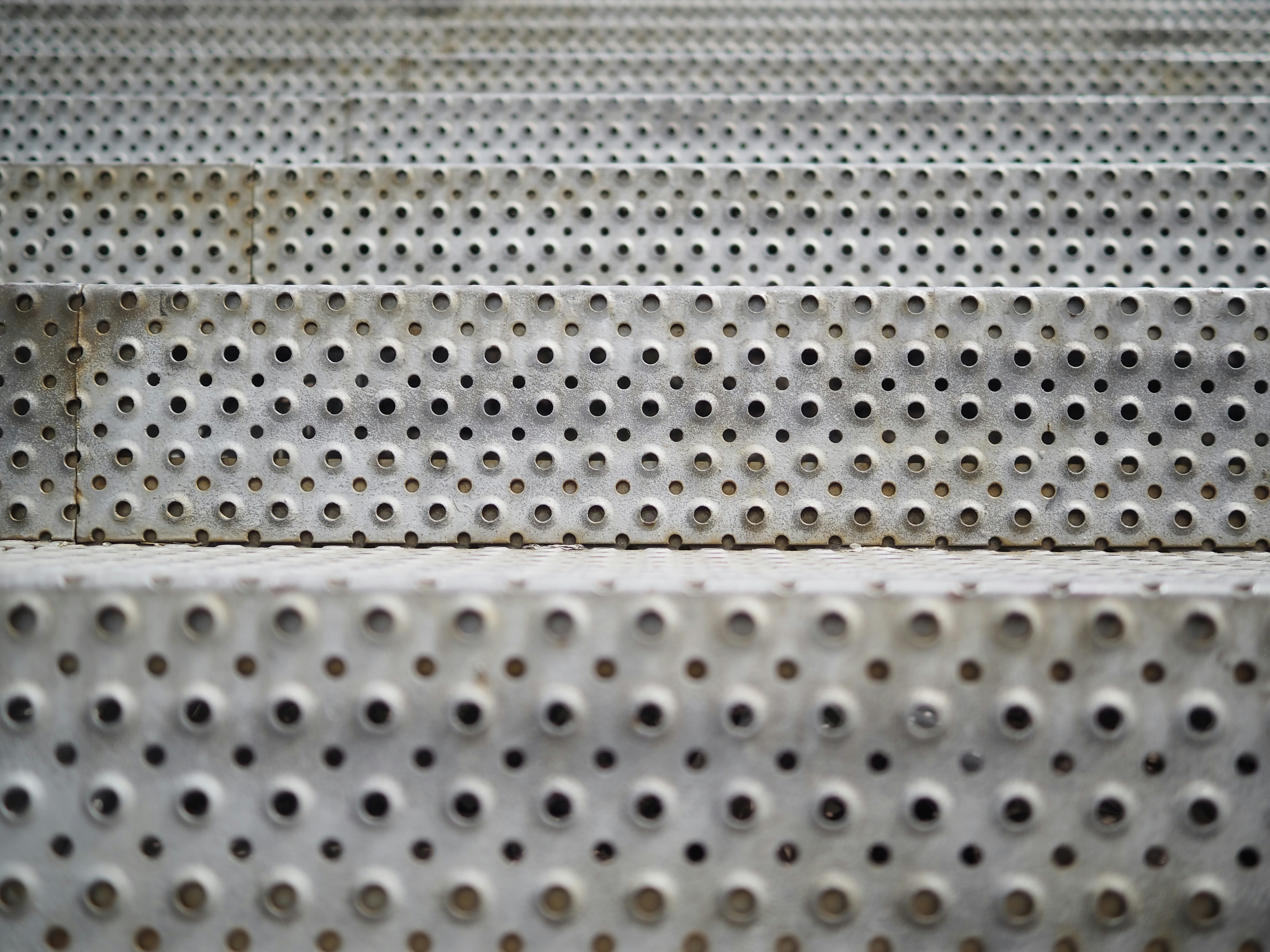 Symmetry in Steel: Repeating Holes and Industrial Steps