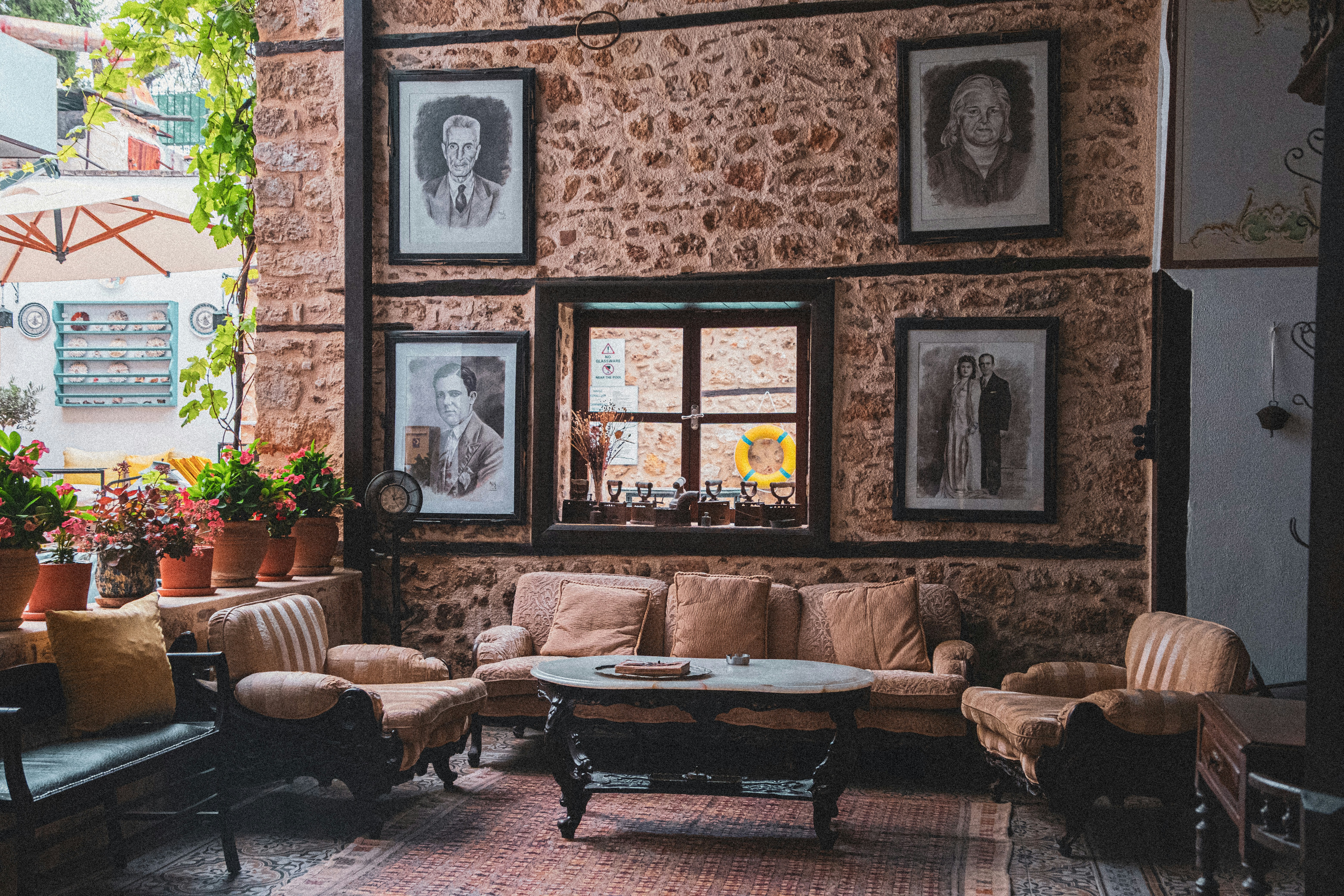 Cozy Salon Gallery: Portraits on Stone Walls