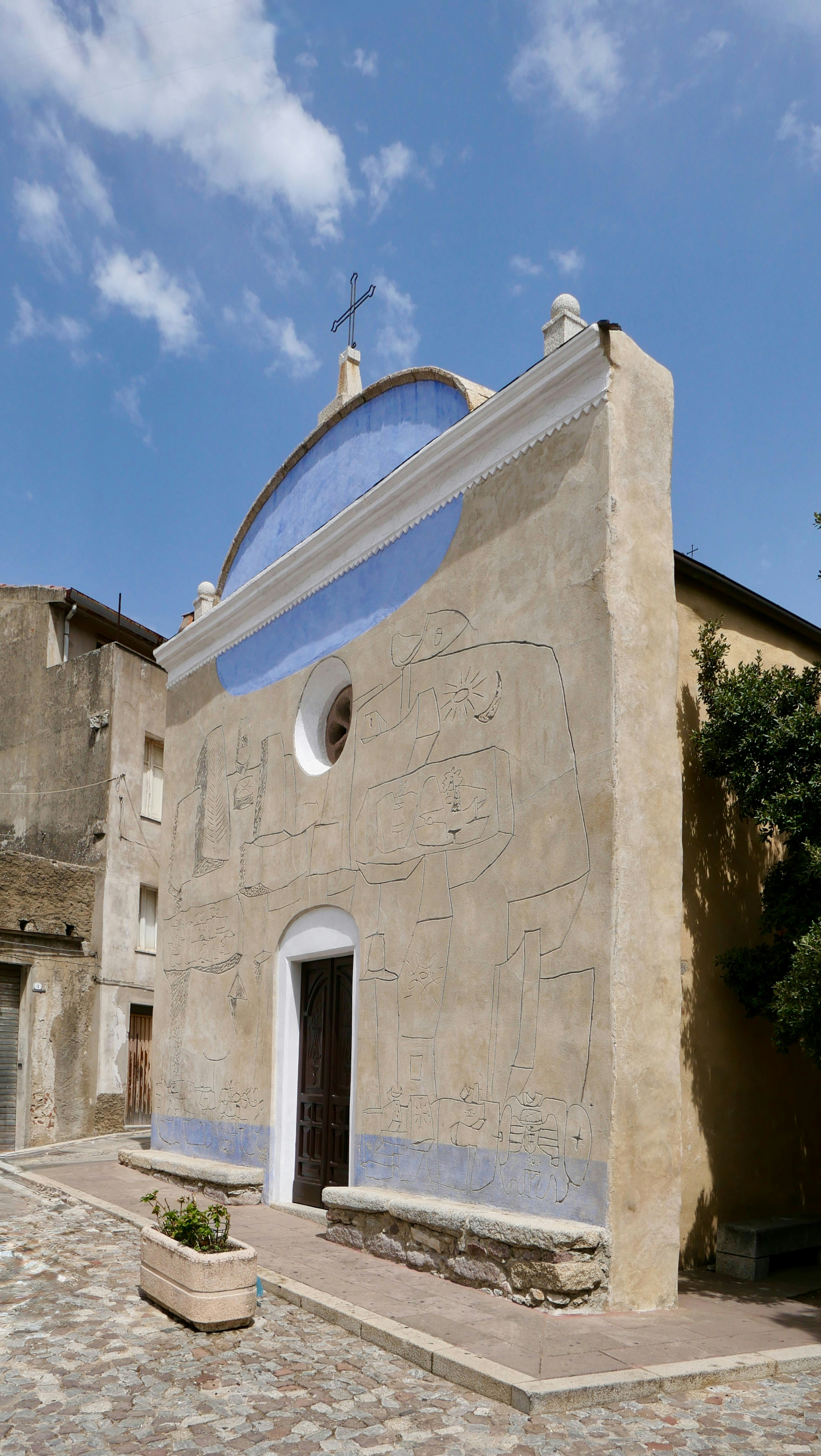 Sunlit chapel on a Mediterranean street