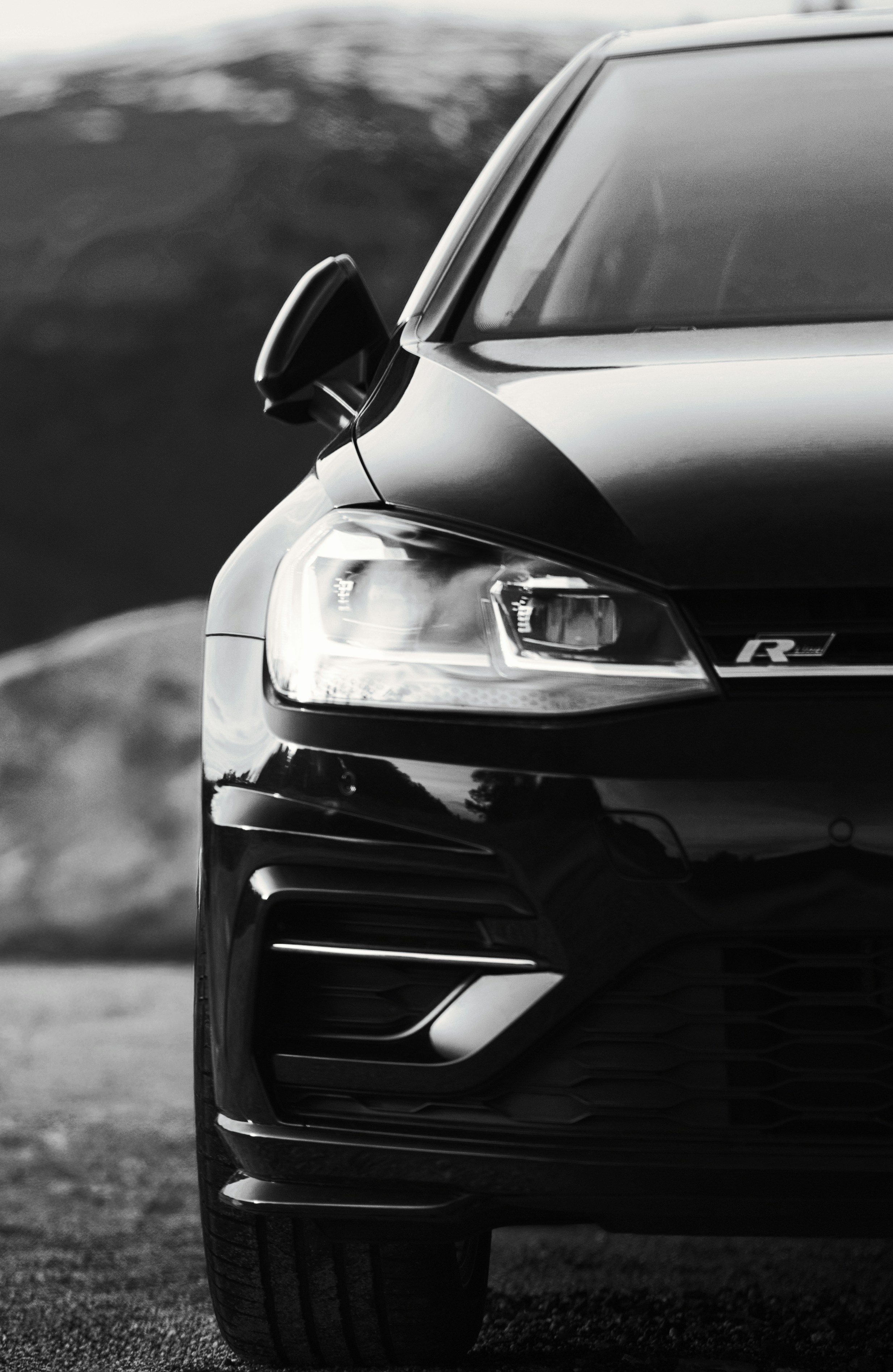 Front-Quarter Power: The Shadowed Grille of a Dominant Contender