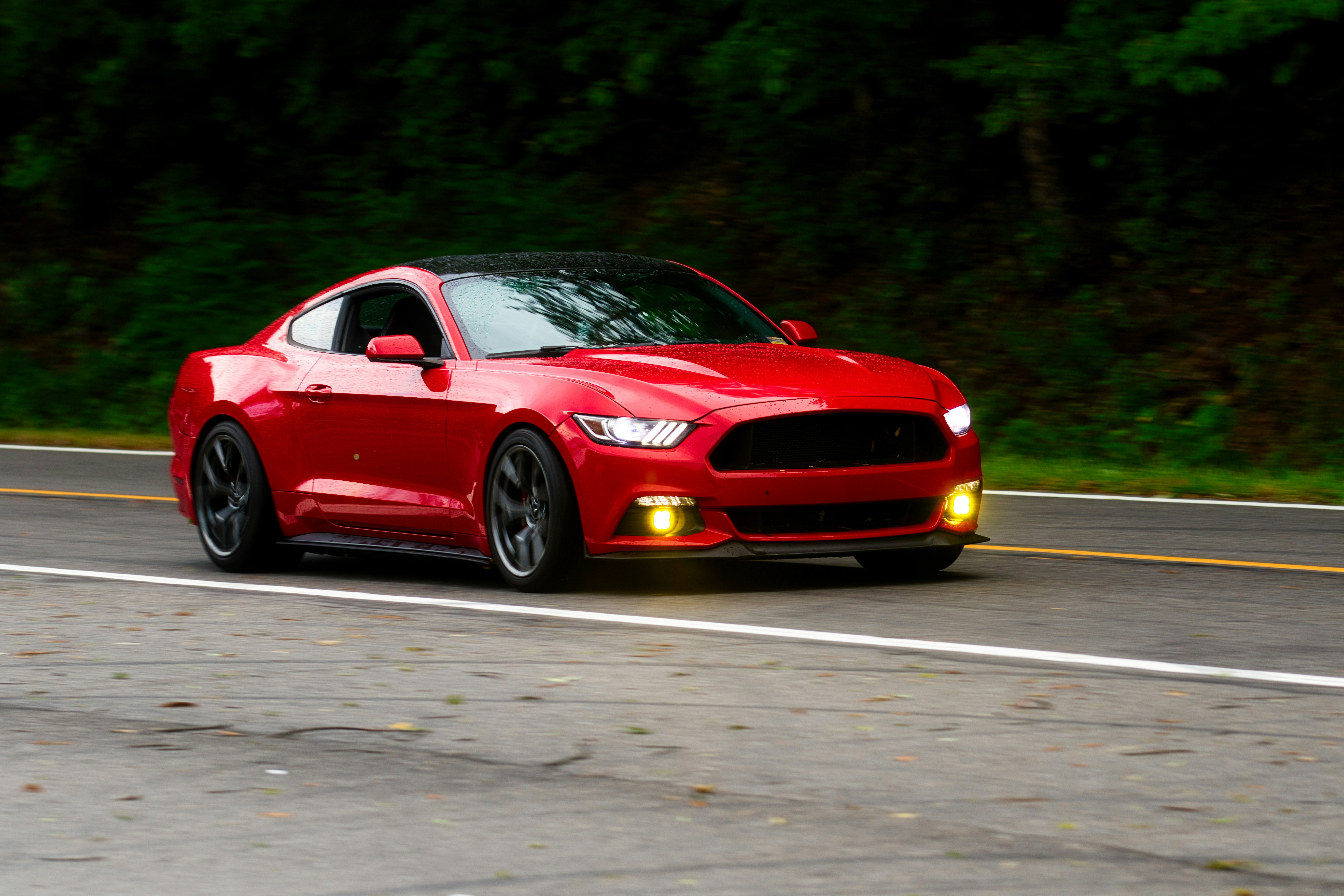 Red Road Blade: A Mustang Halves the Asphalt in Morning Light