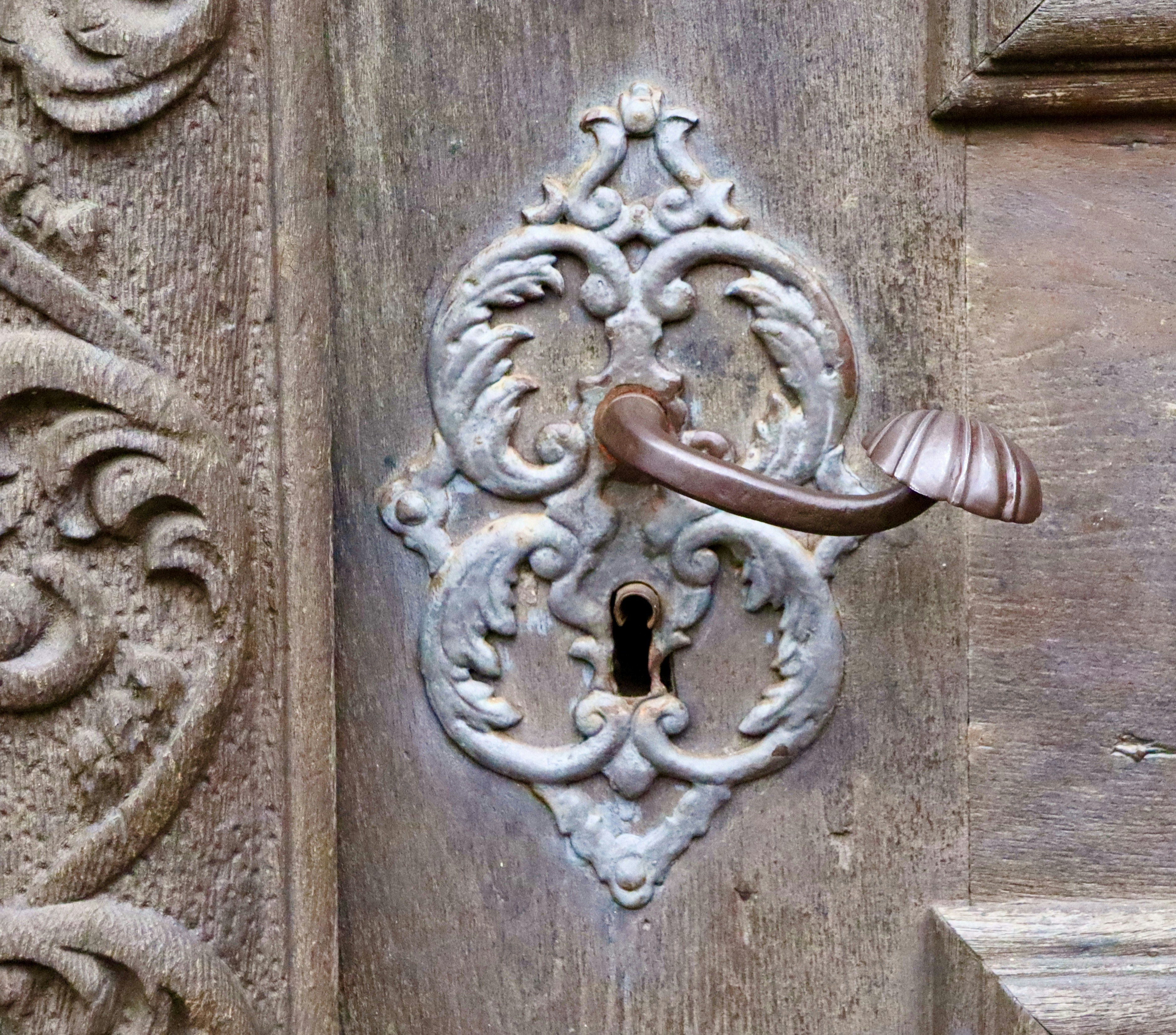 Ornate Door Handle in Weathered Ironwork