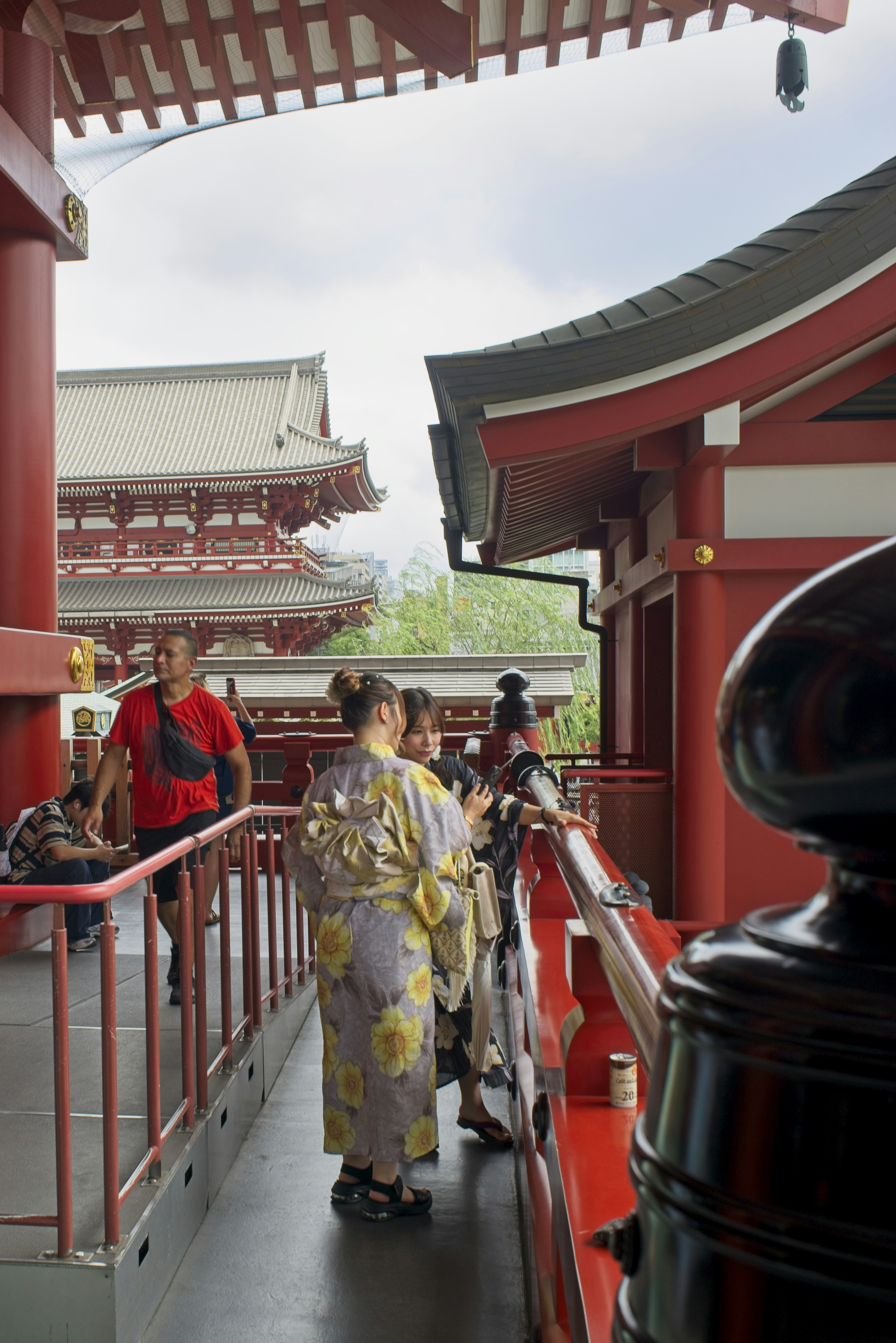 Red Lanterns and Kimono: A Moment on Tokyo Temple Walkway