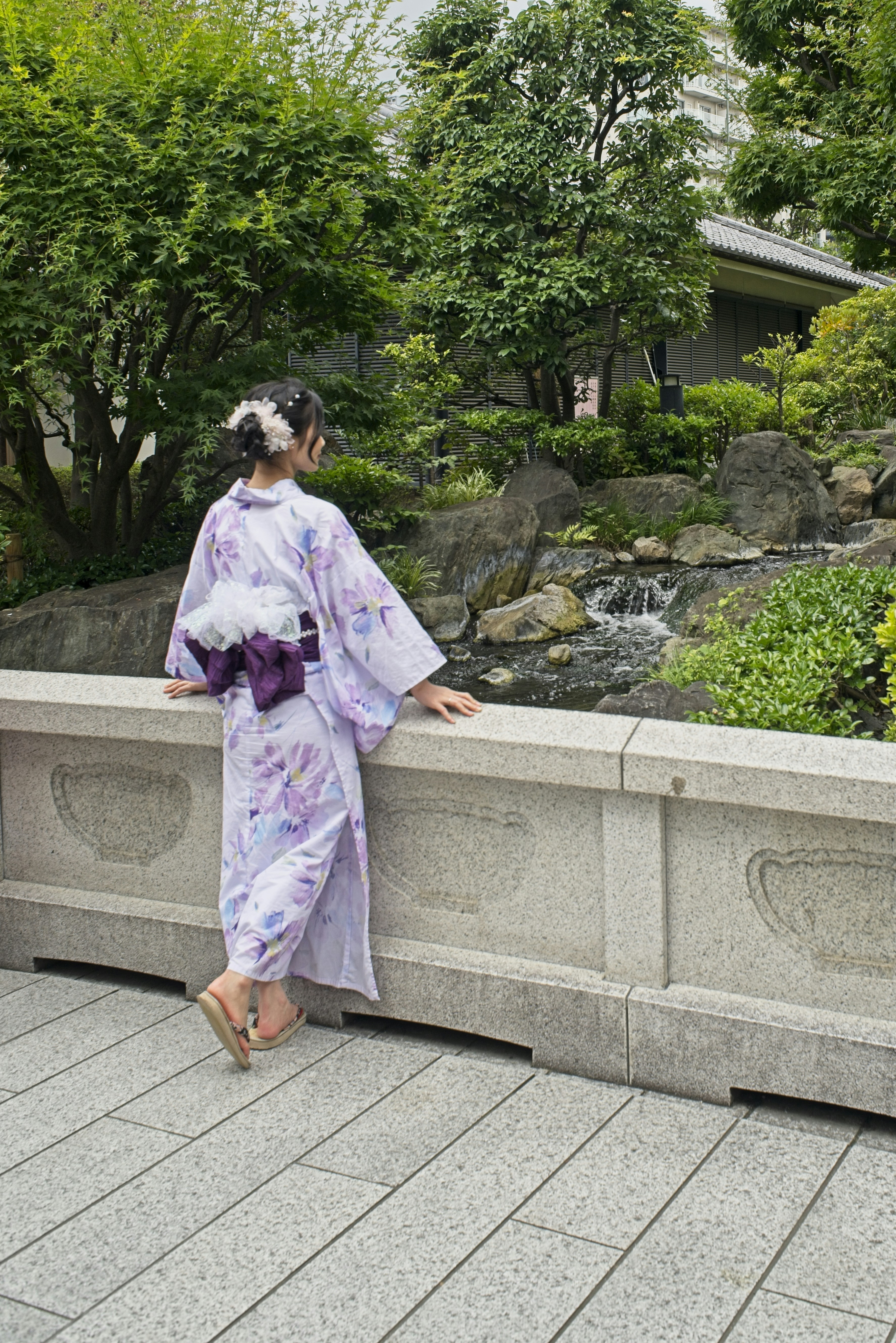 Kimono in the Garden: A Quiet Moment by the Stone Rail