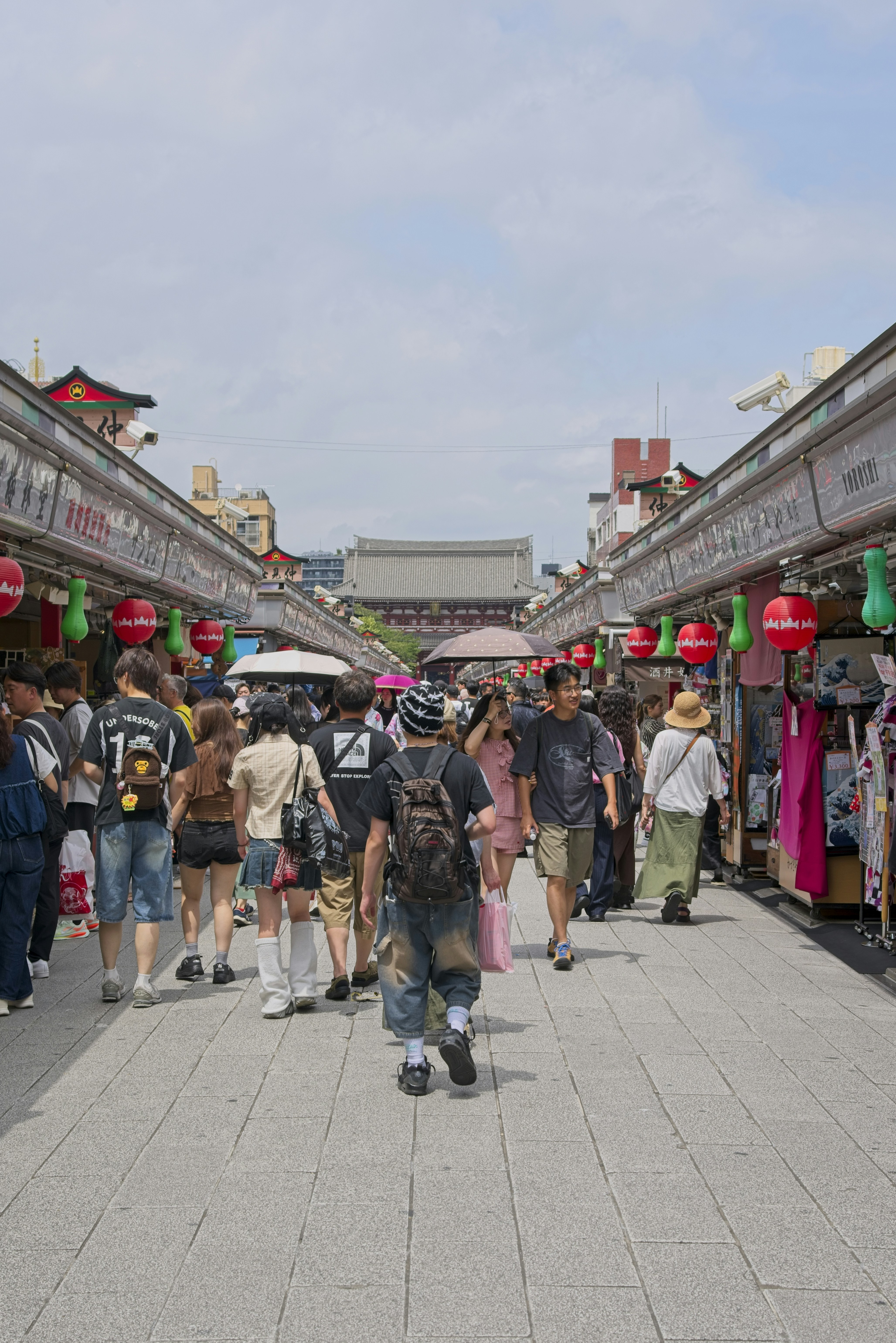 Crowded Market Corridor under Traditional Shaded Roofs
