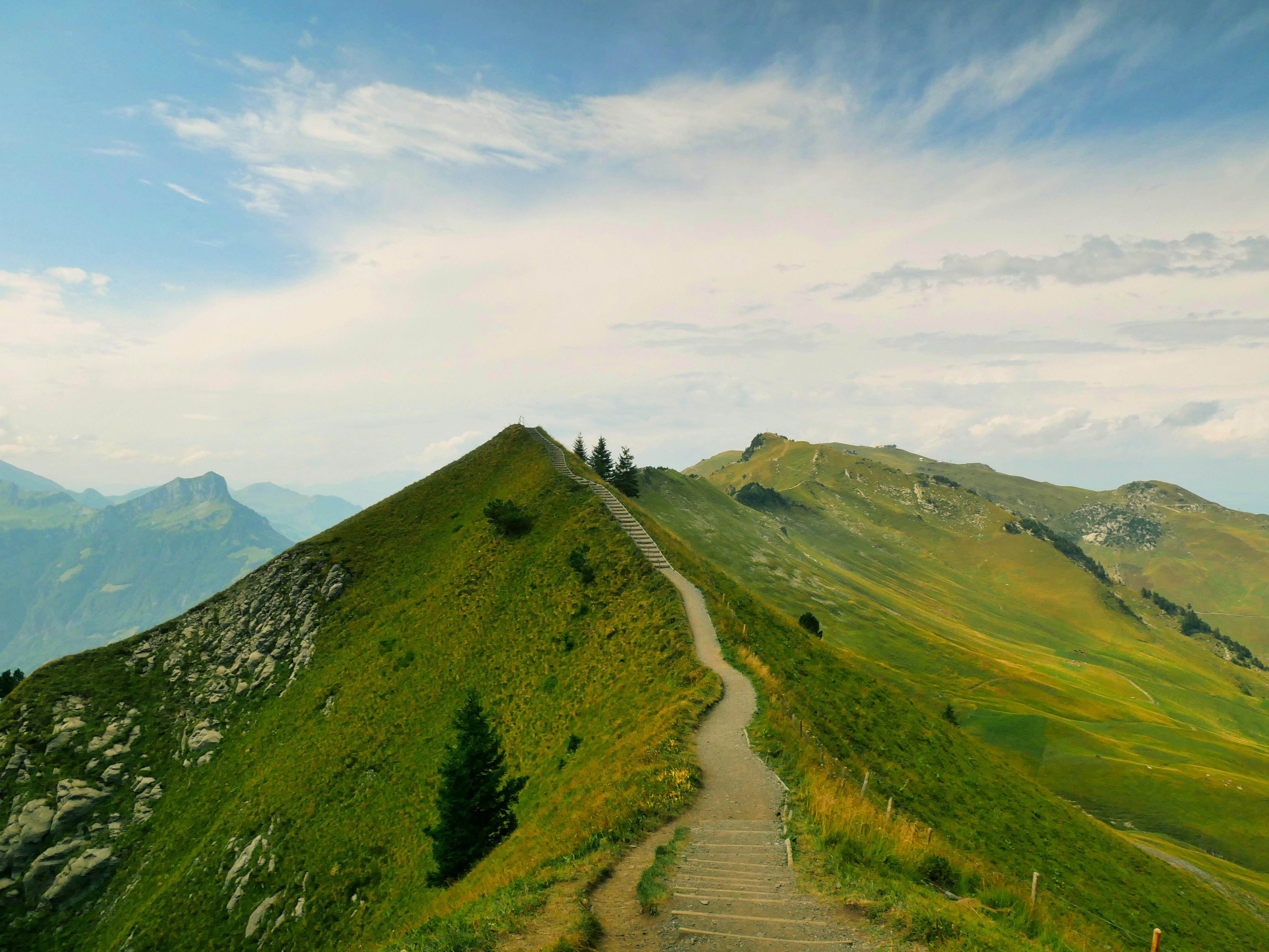 Path Along a Quiet Summit: A Ridge Walk at Dusk