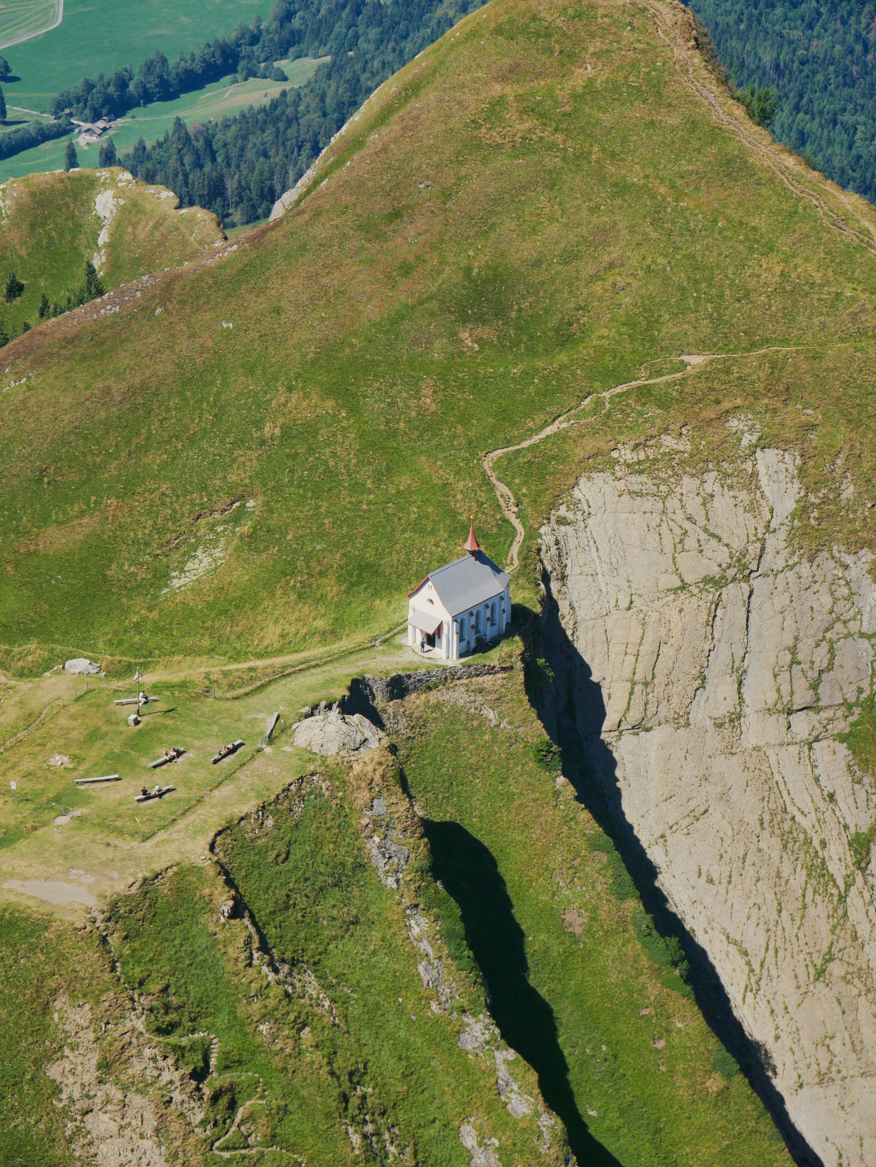 Cliffside Chapel: A Lone Church Perched on the Mountain Carved by Time