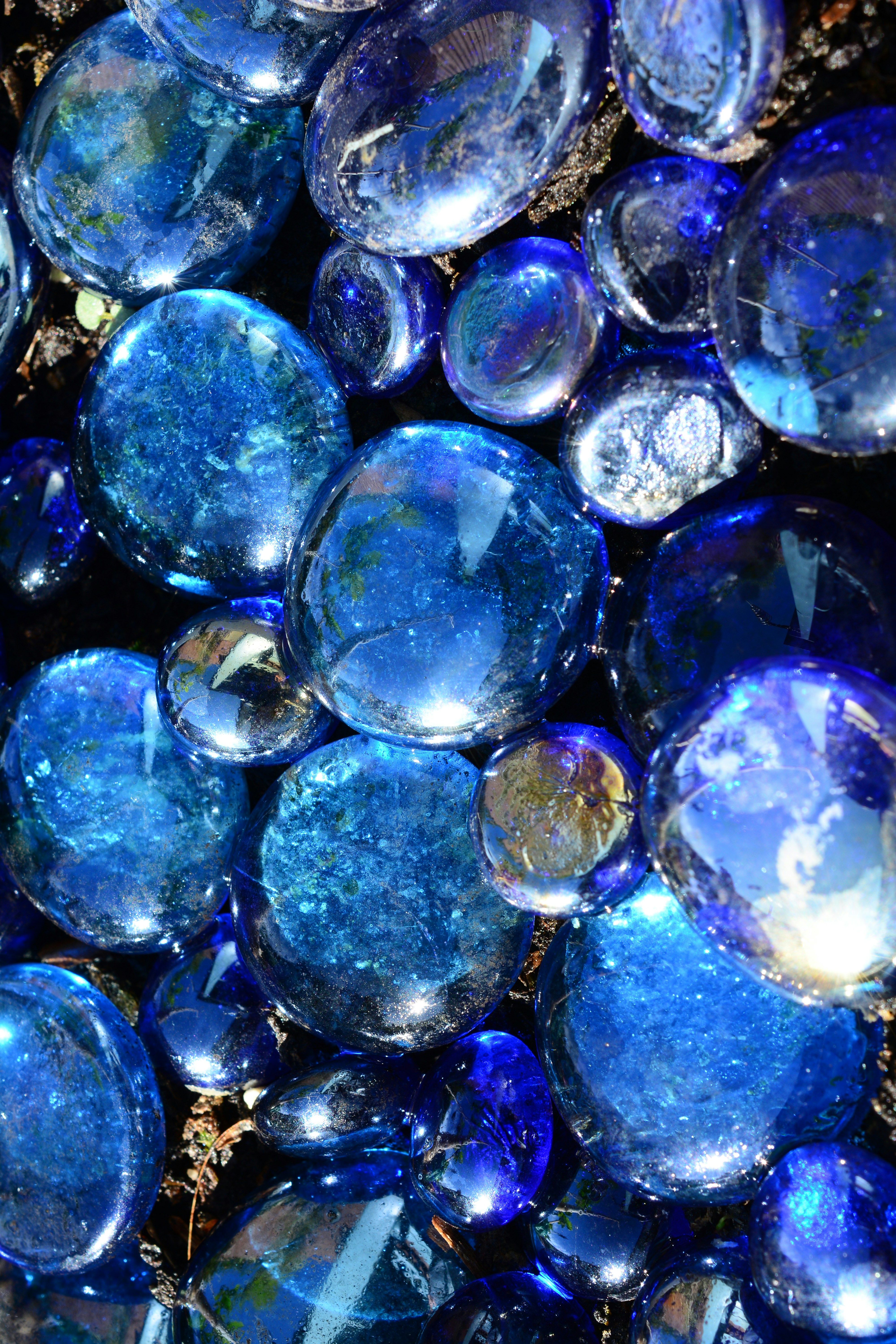 Azure Orbs: A Close Clustering of Glassy Riches