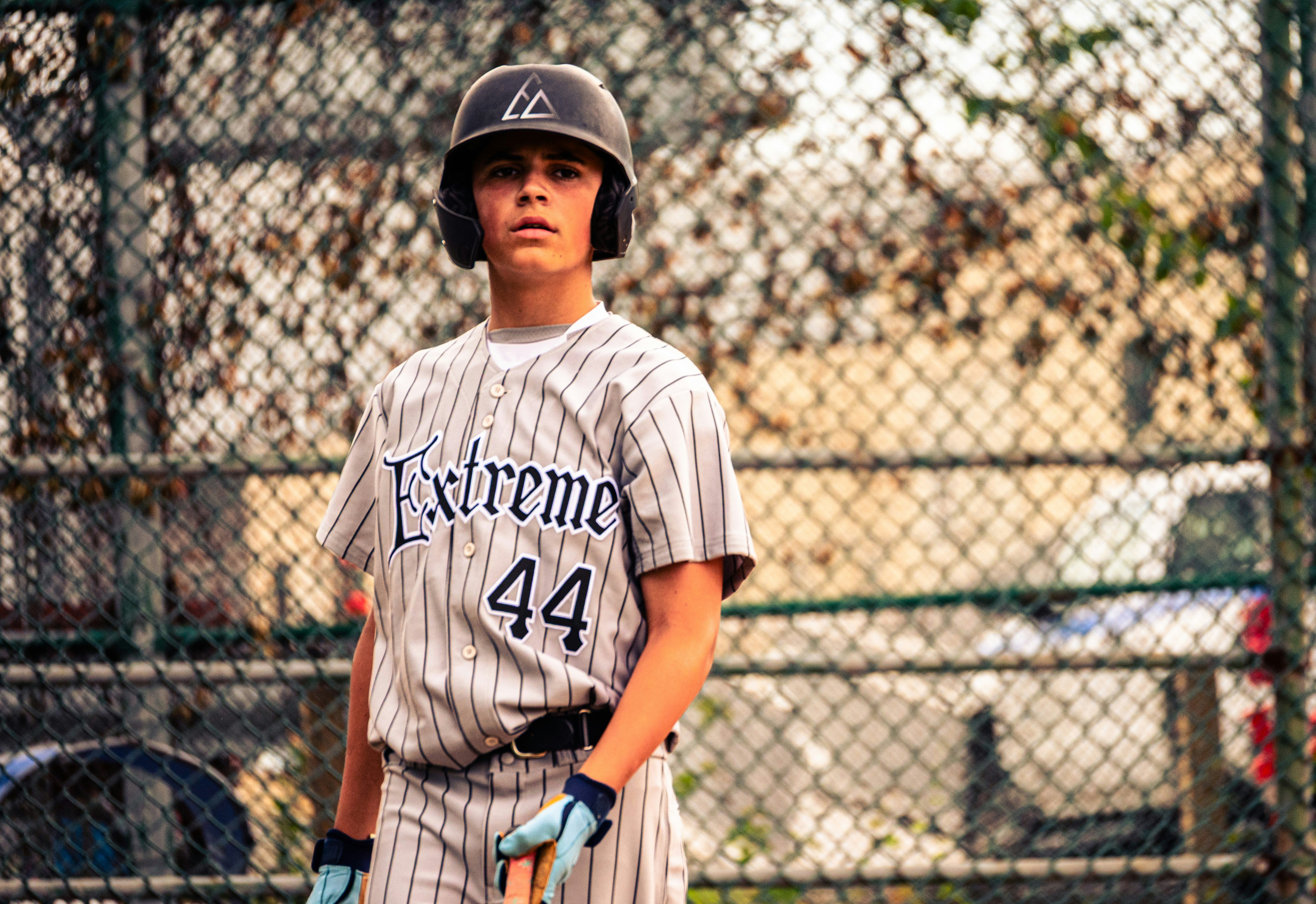 Helmeted at Batter’s Hill: A Pinch of Confidence in Pinstripes
