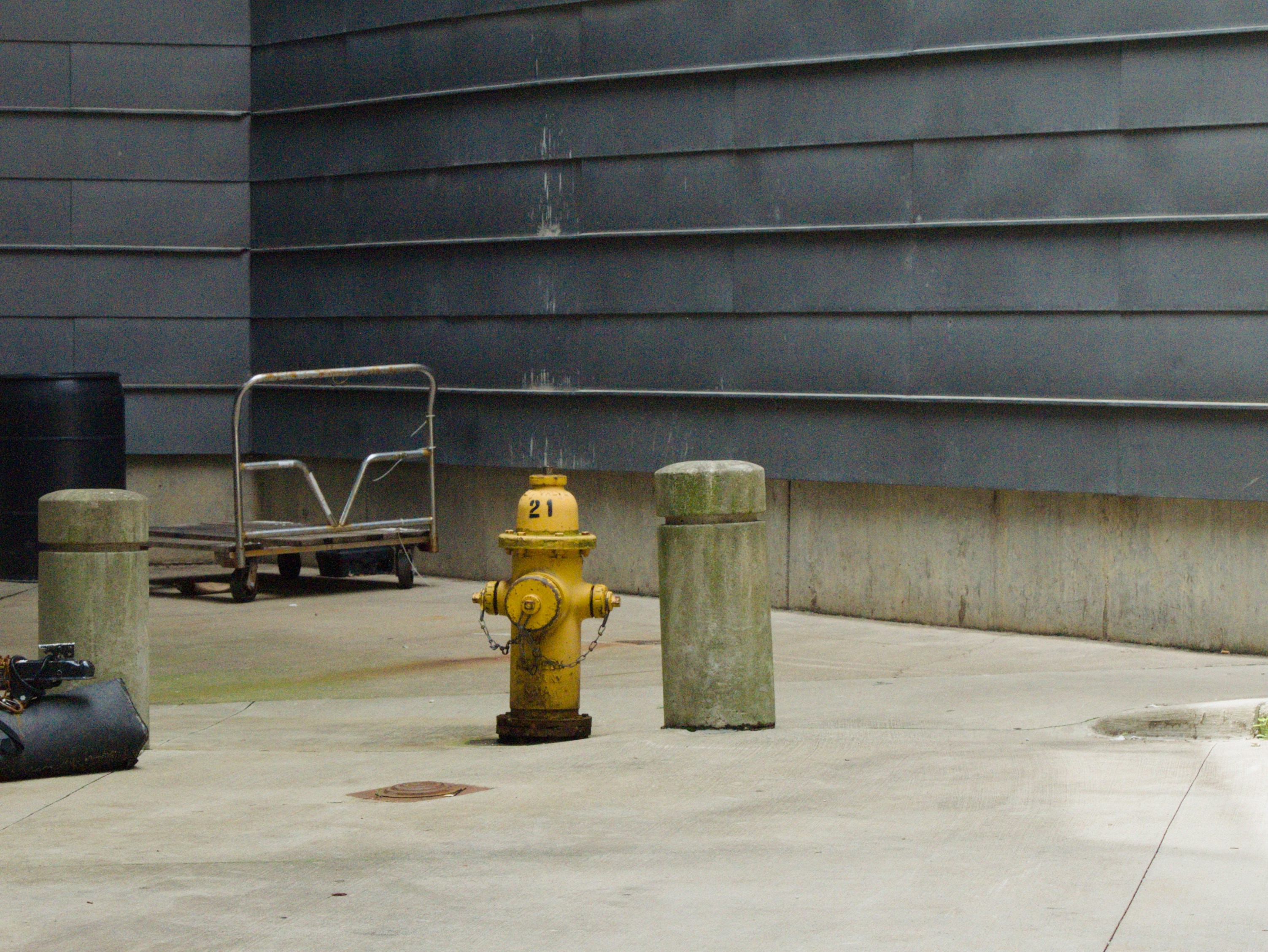 Yellow Fire Hydrant at Industrial Corner
