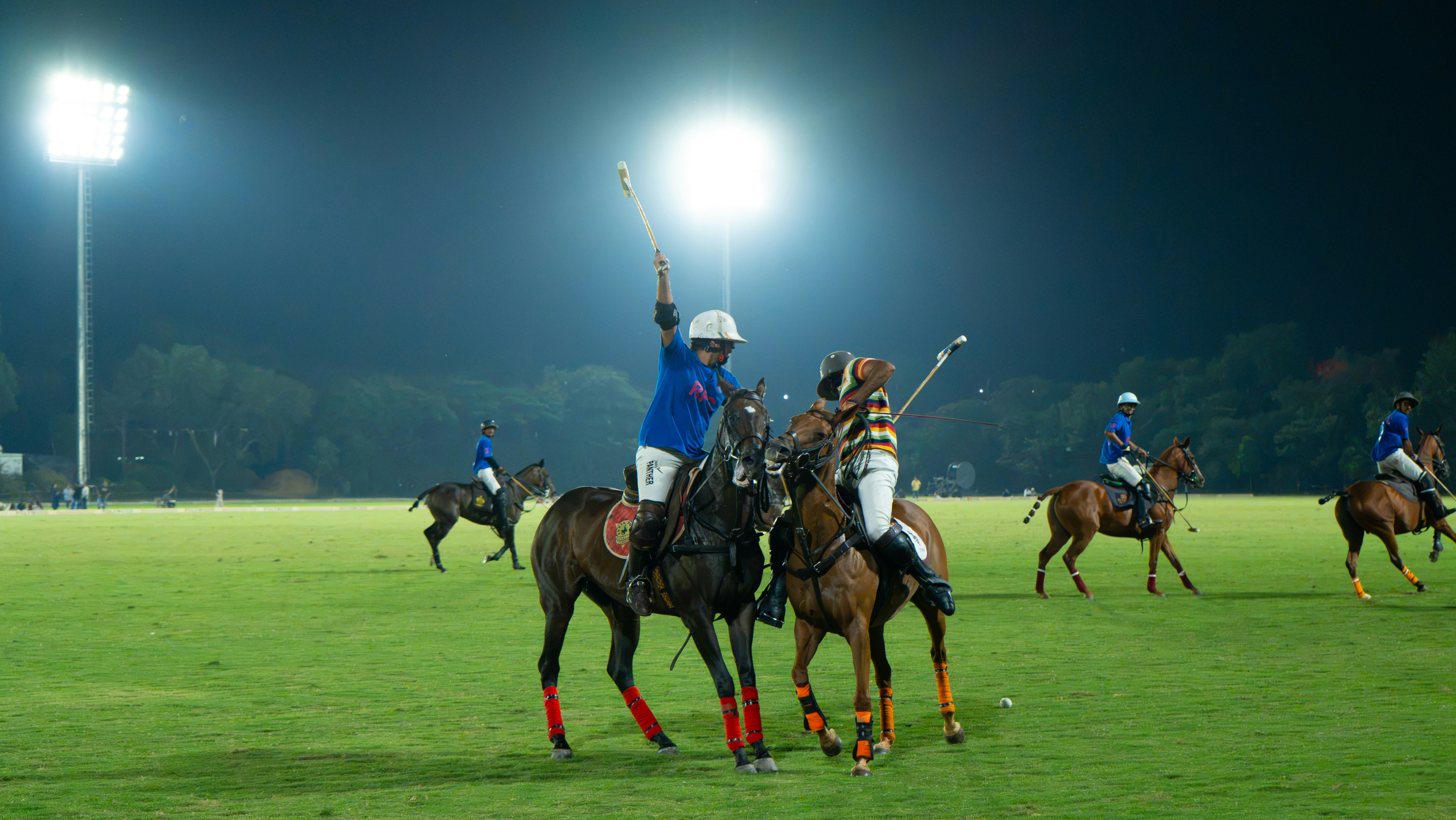 Midnight Polo: Uppercut Moment Under Stadium Lights