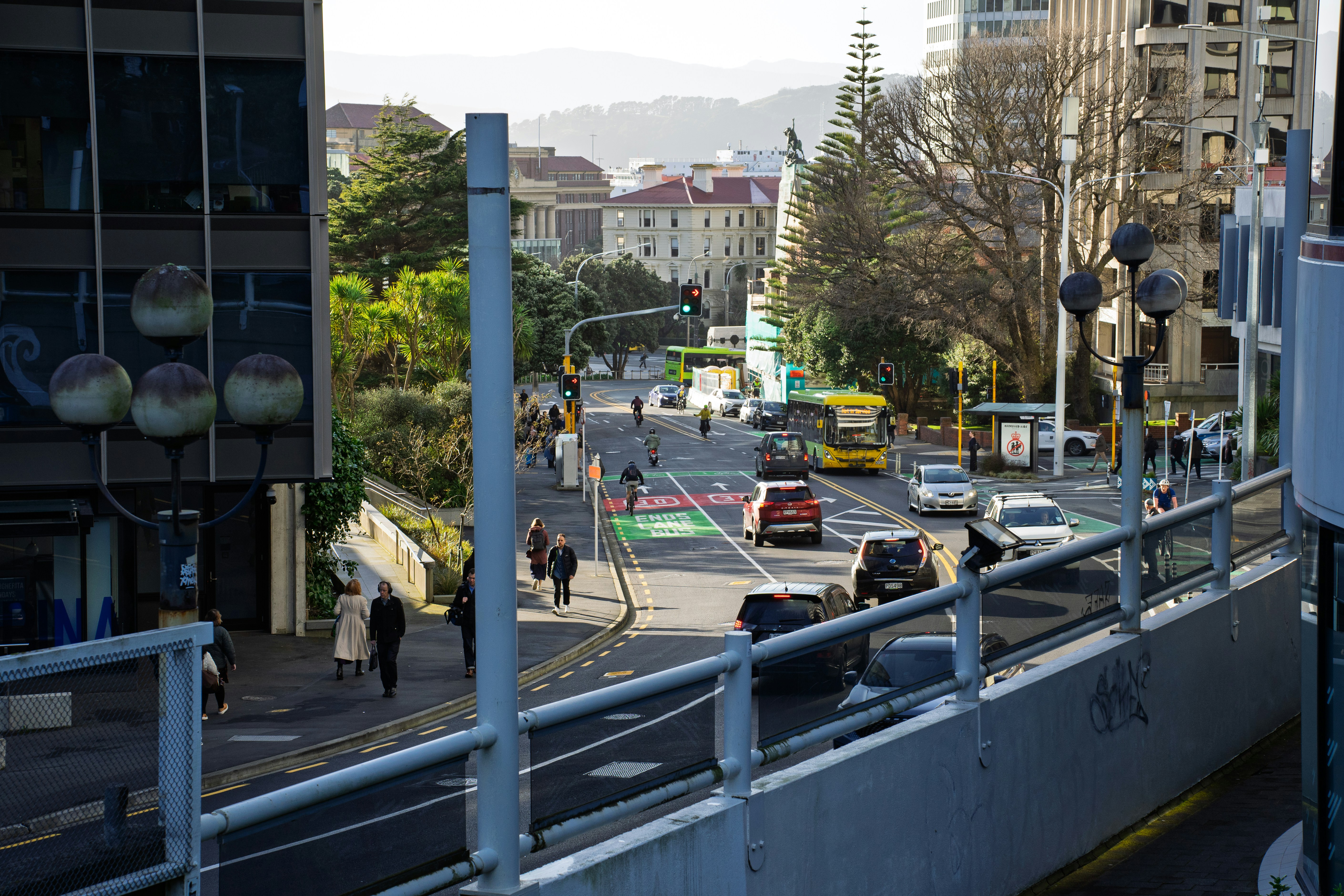 Crossroads Above the City: A Busy Urban Walkway Between Elevations