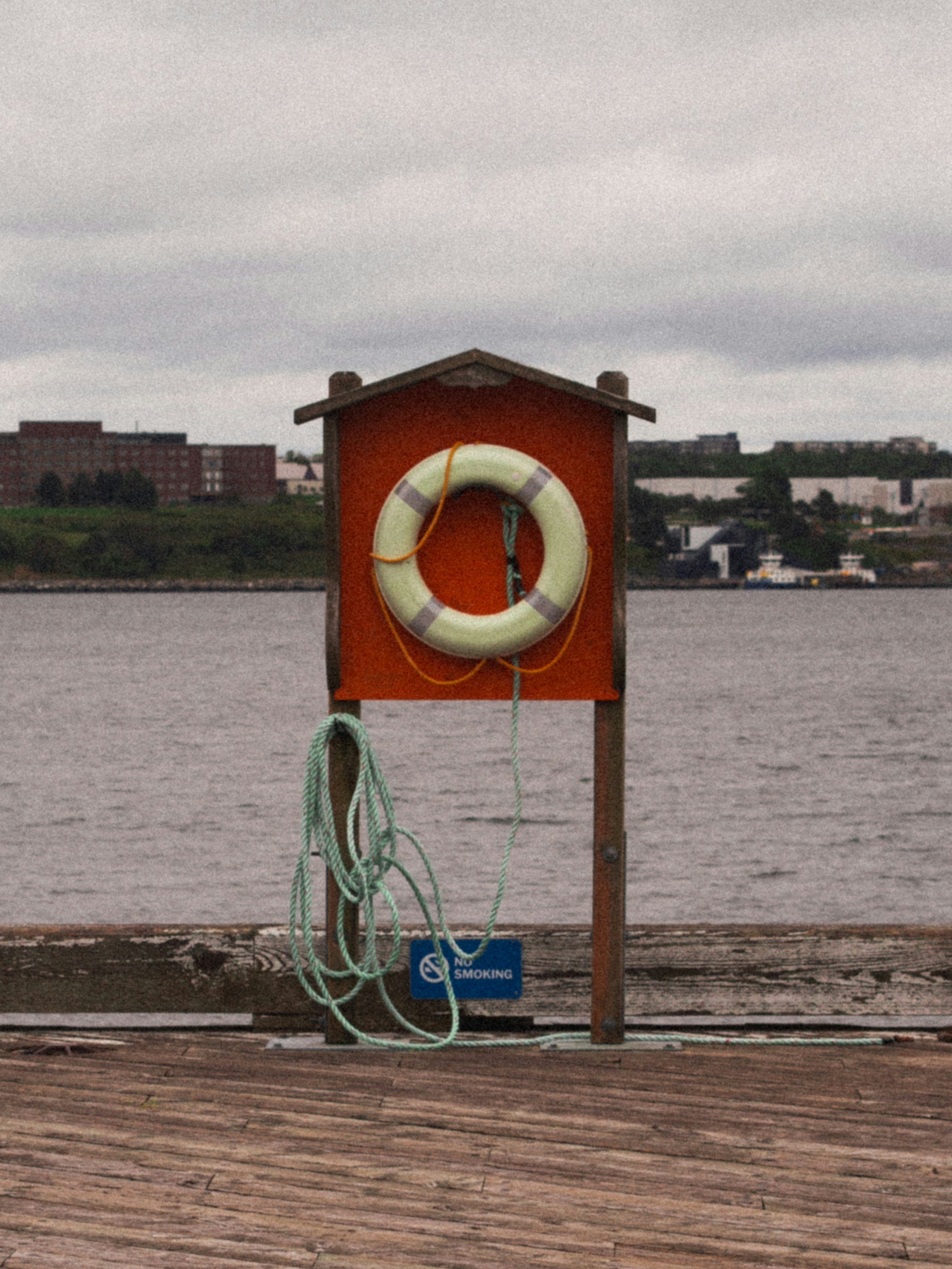 Lifebuoy Post at a Waterfront Dock
