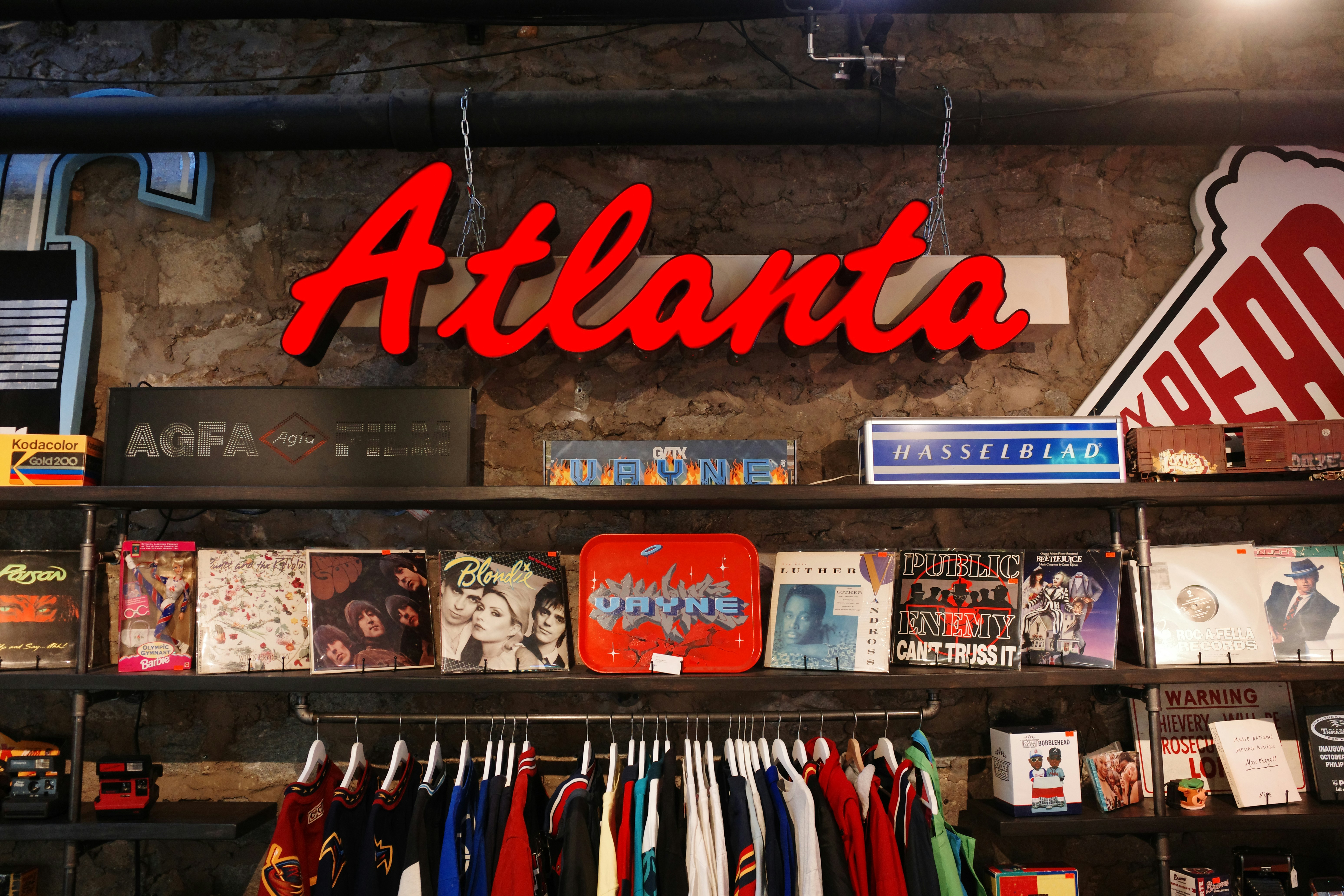 Neon Script over a Vinyl Bazaar: Atlanta Memorabilia in a Rock Shop