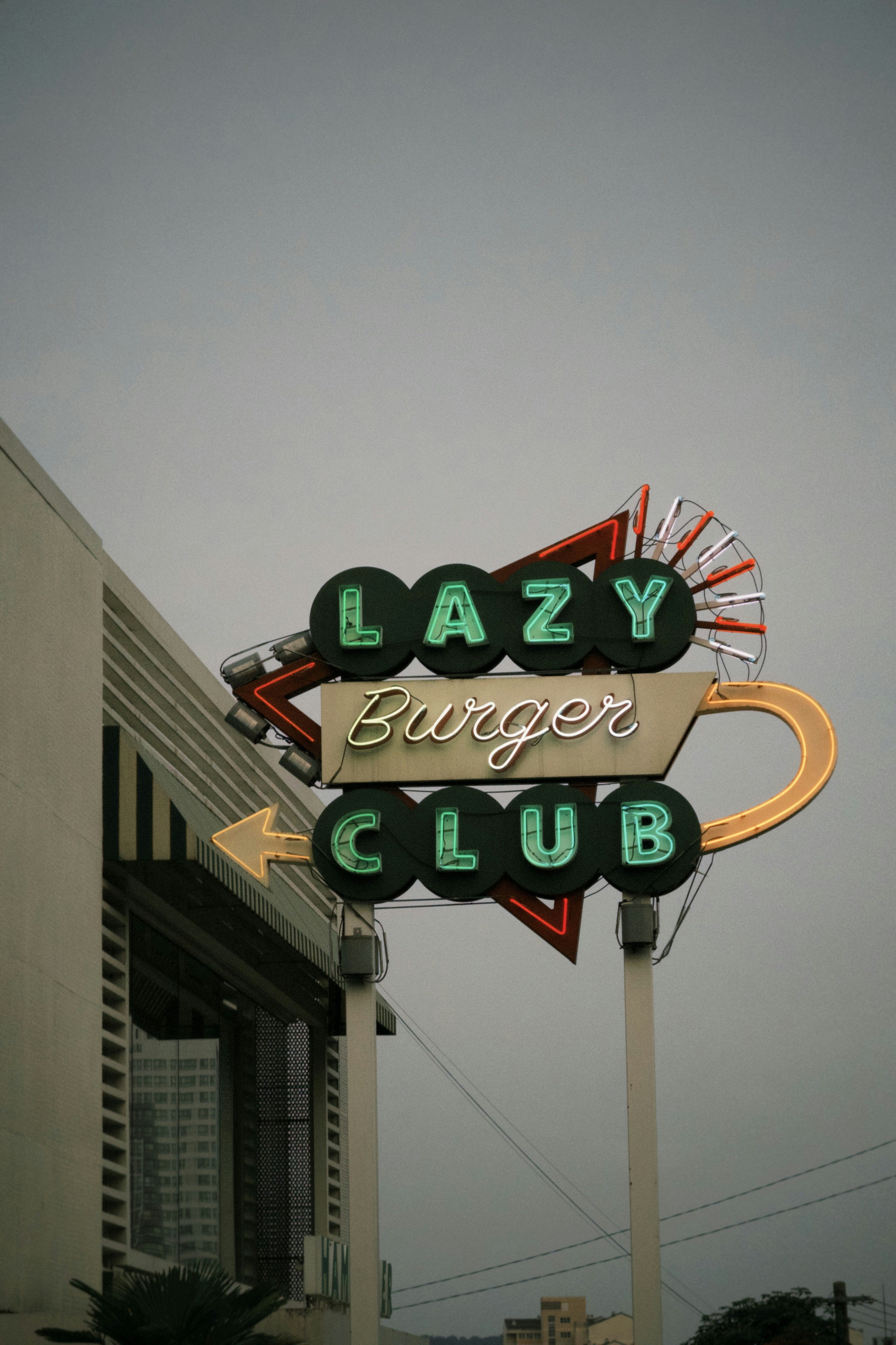 Neon Laziness: A Retro Sign Cast in Evening Quiet