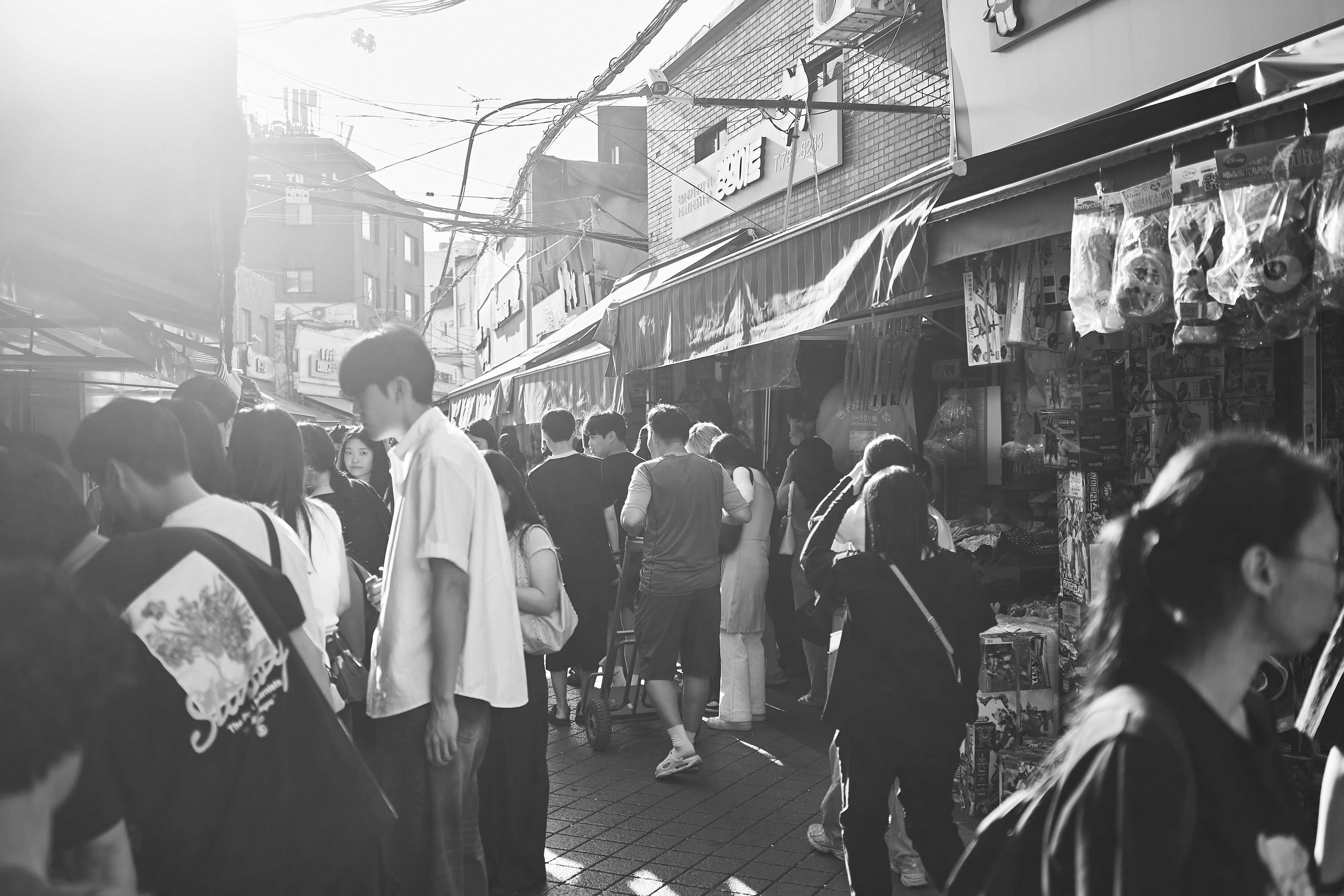 Crowd at a Bustling Market Street in Mono