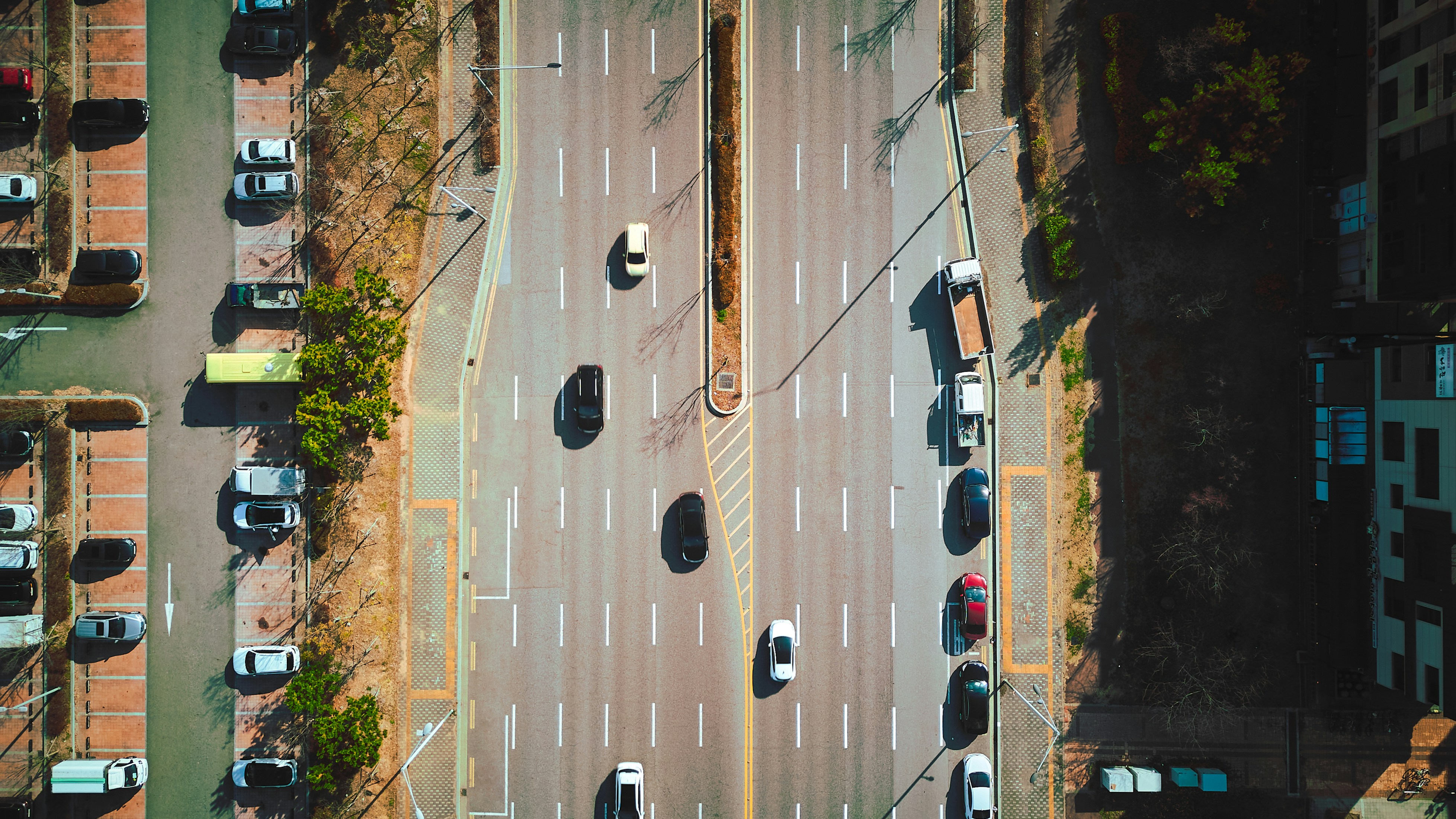 Urban Thoroughfare: Aerial Rhythm Over a Busy City Street