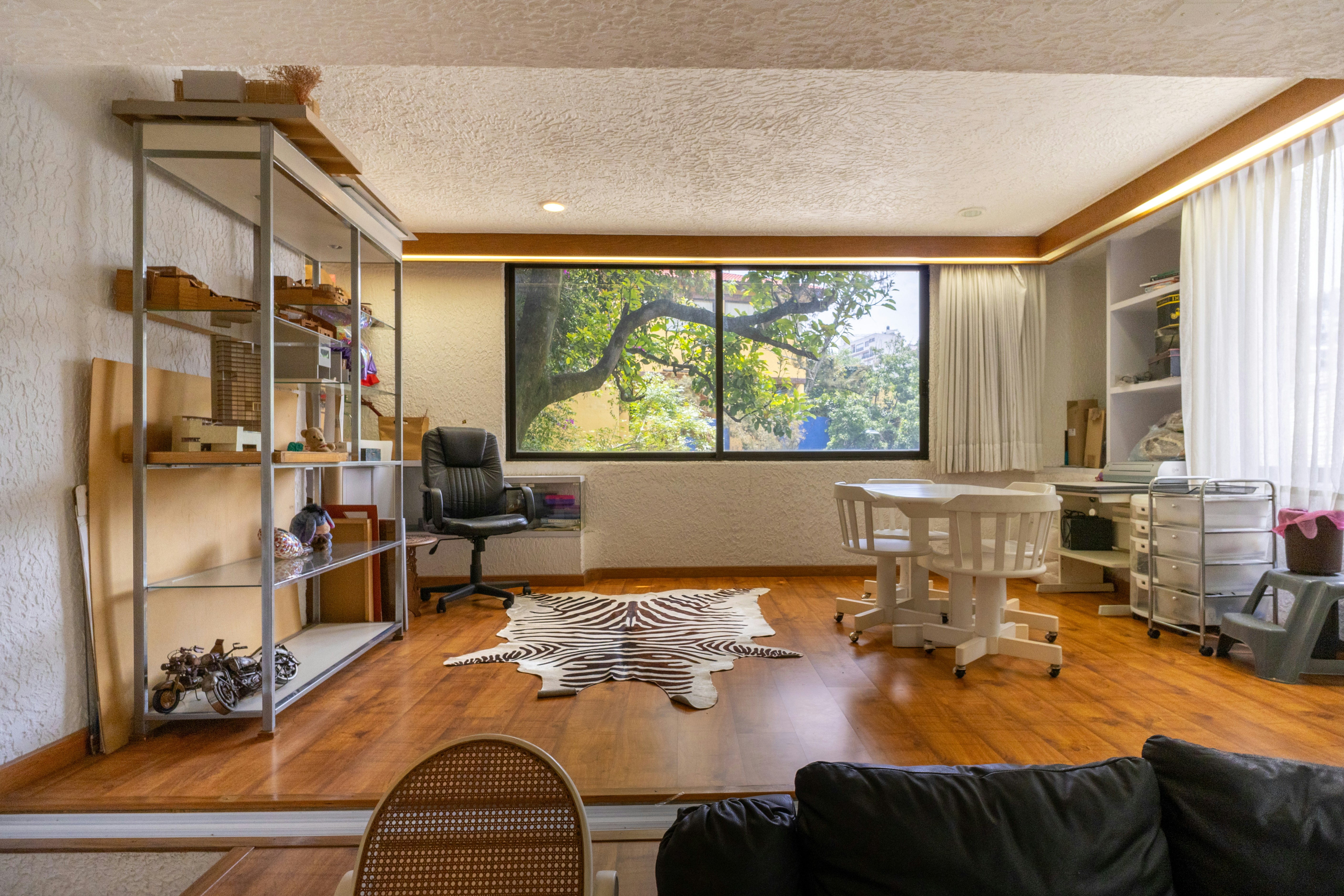 Sunlit Home Office Opens to a Quiet Outside View
