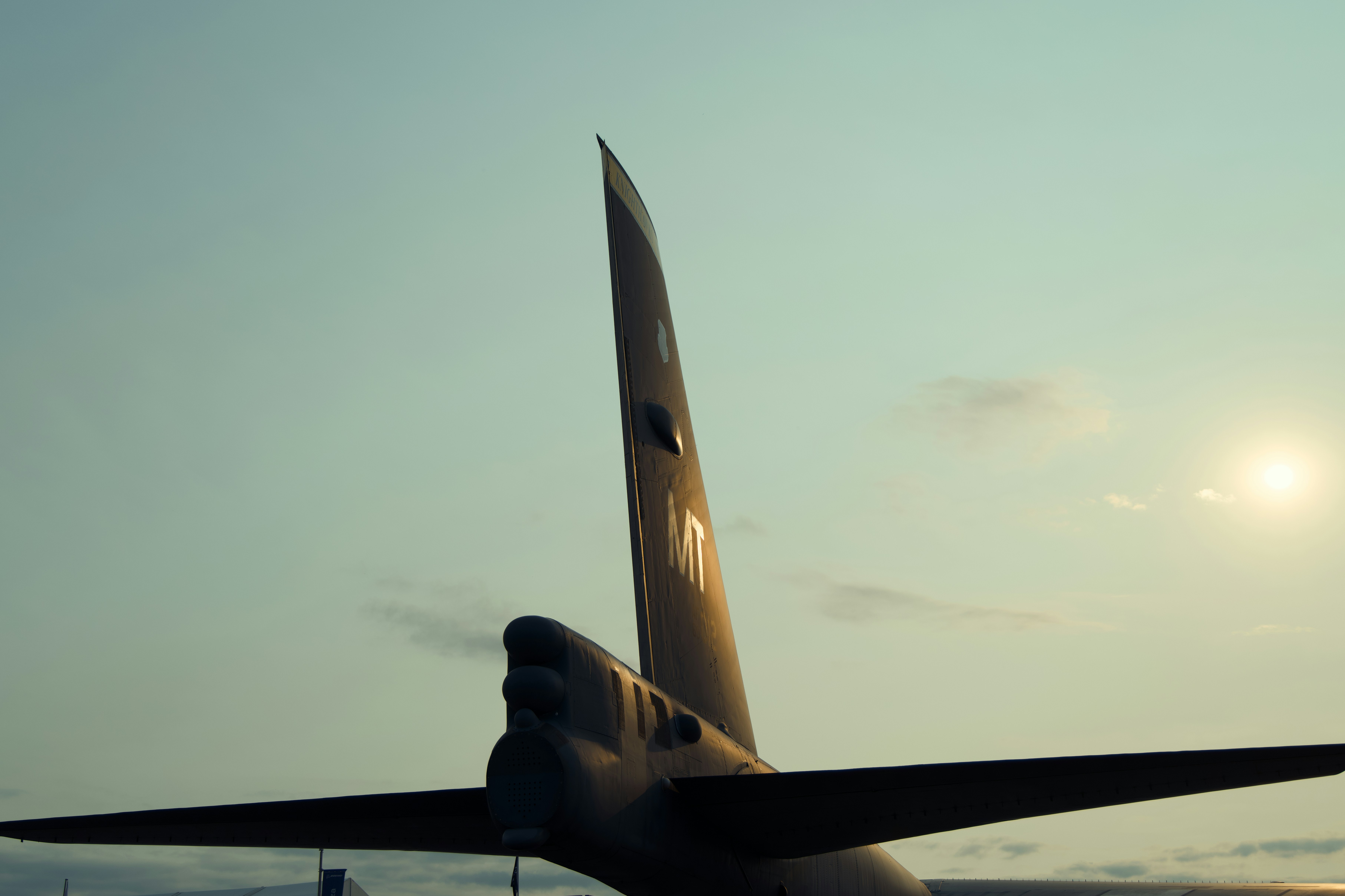 Tailfin Passage: A Jetline Poised at Dusk