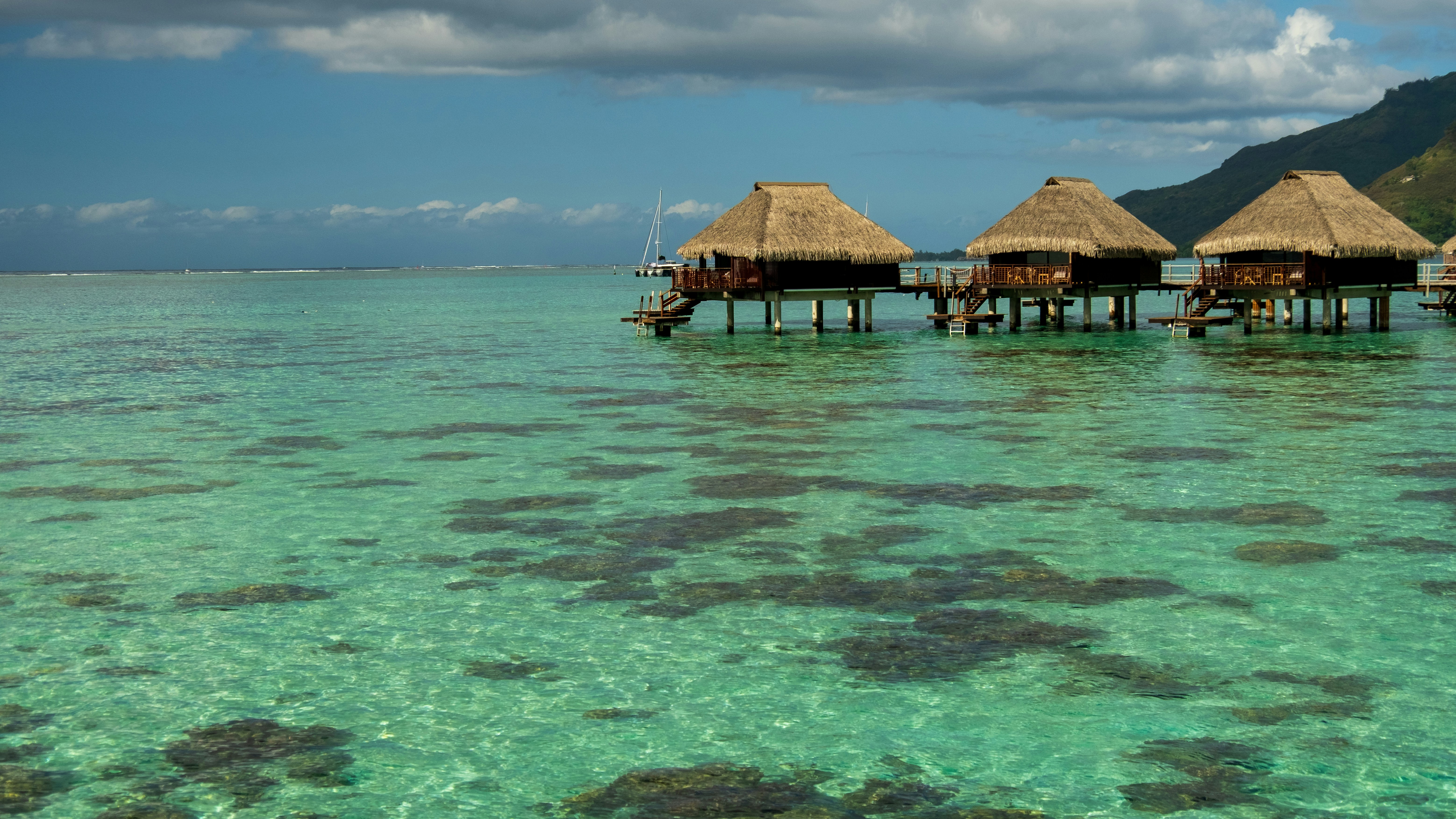 Overwater Bungalows Beyond turquoise shallows