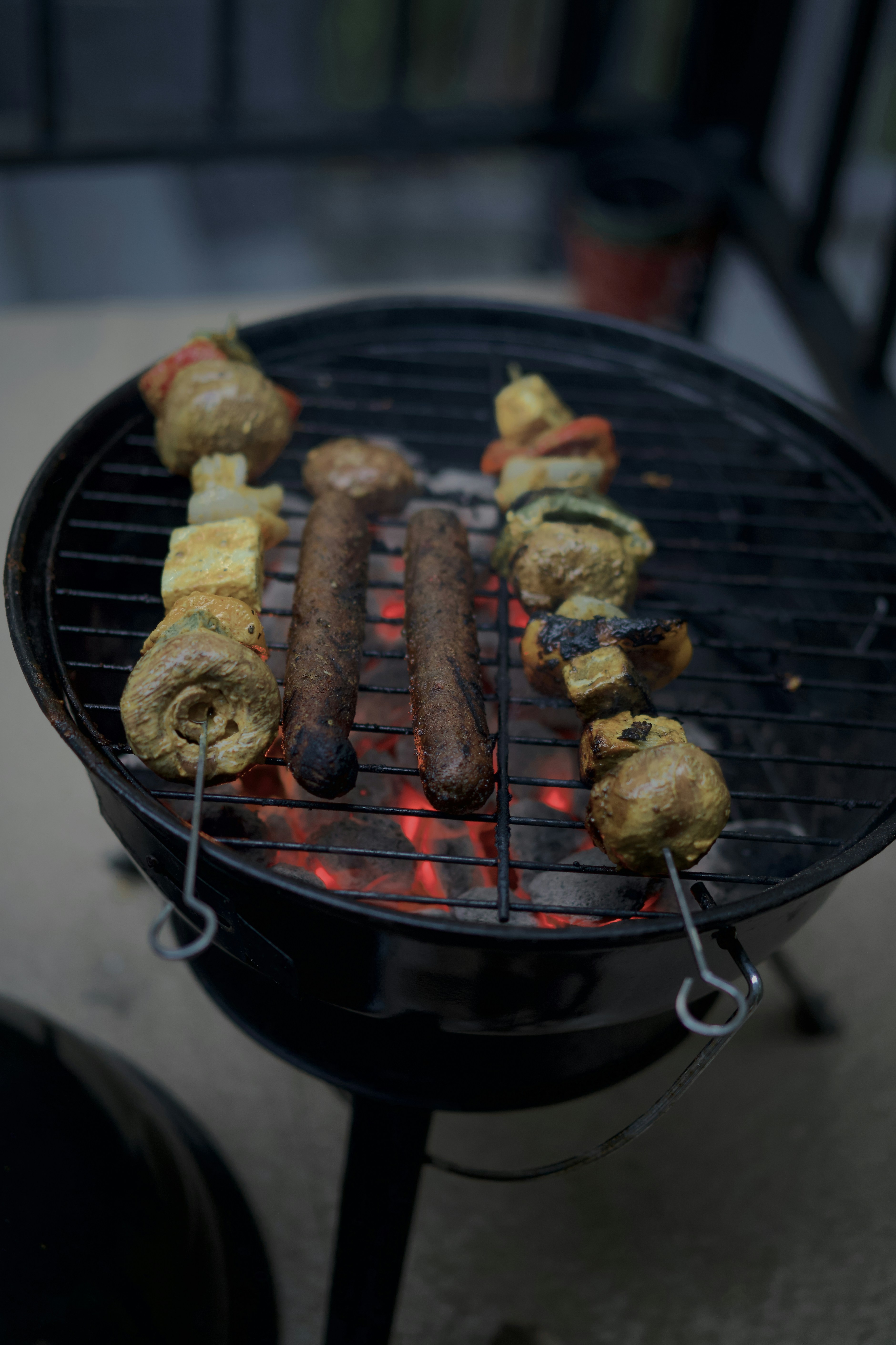 Charred Kebabs on Embered Grate: Evening Barbecue Focus
