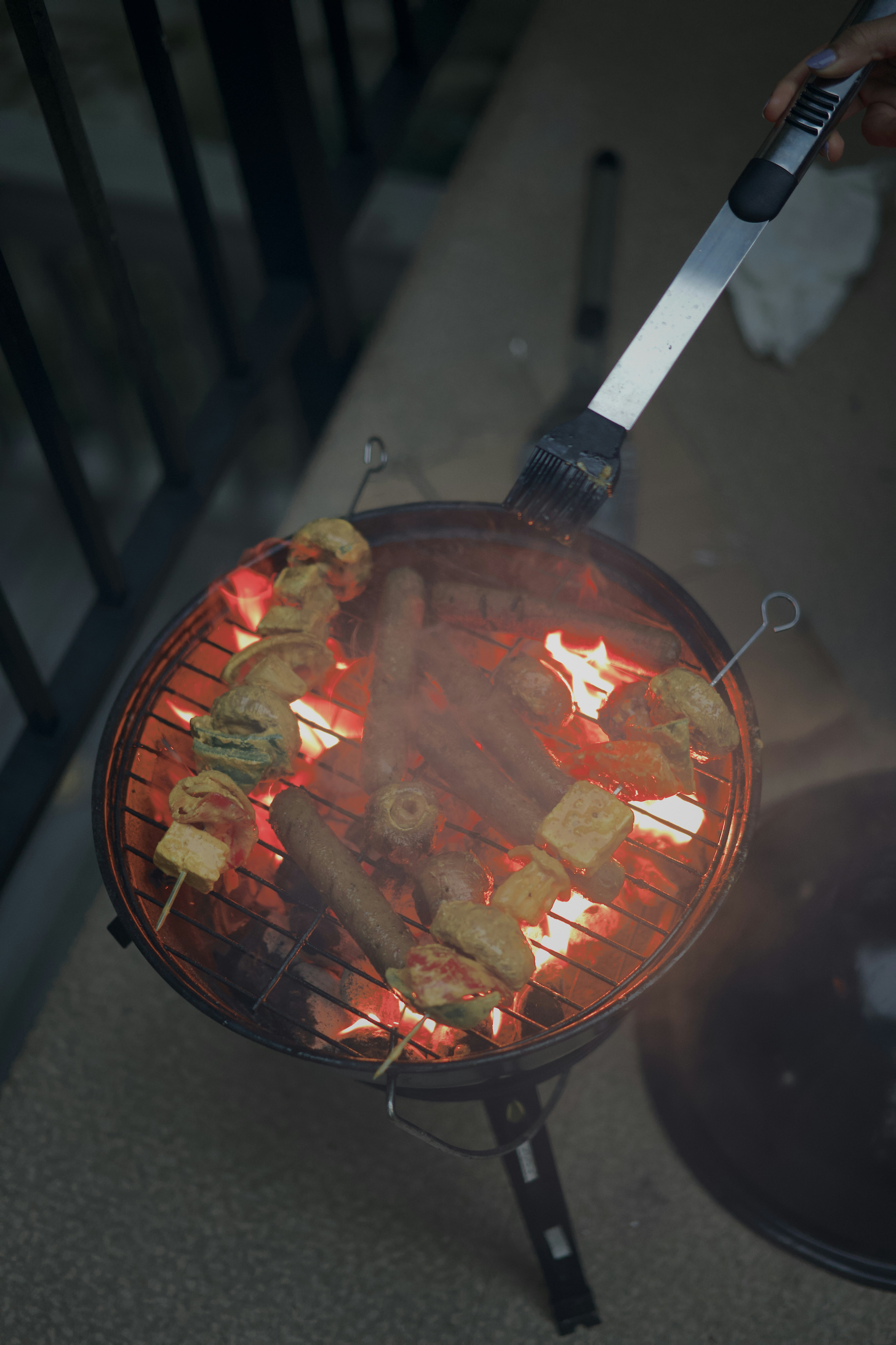 Embers and Skewers: Evening BBQ on a Balcony Grill