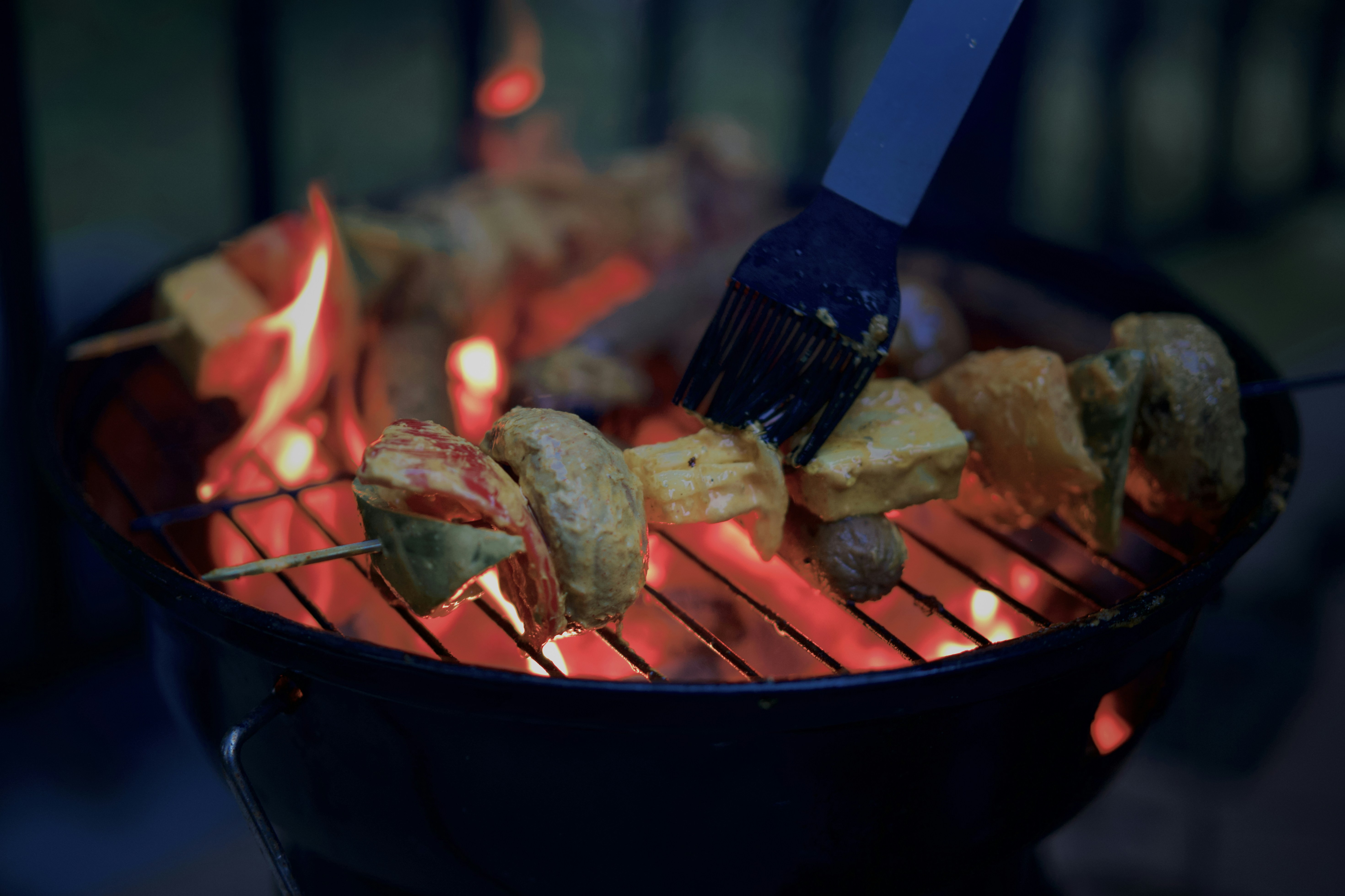 Charred Skewers Over Ember Glow