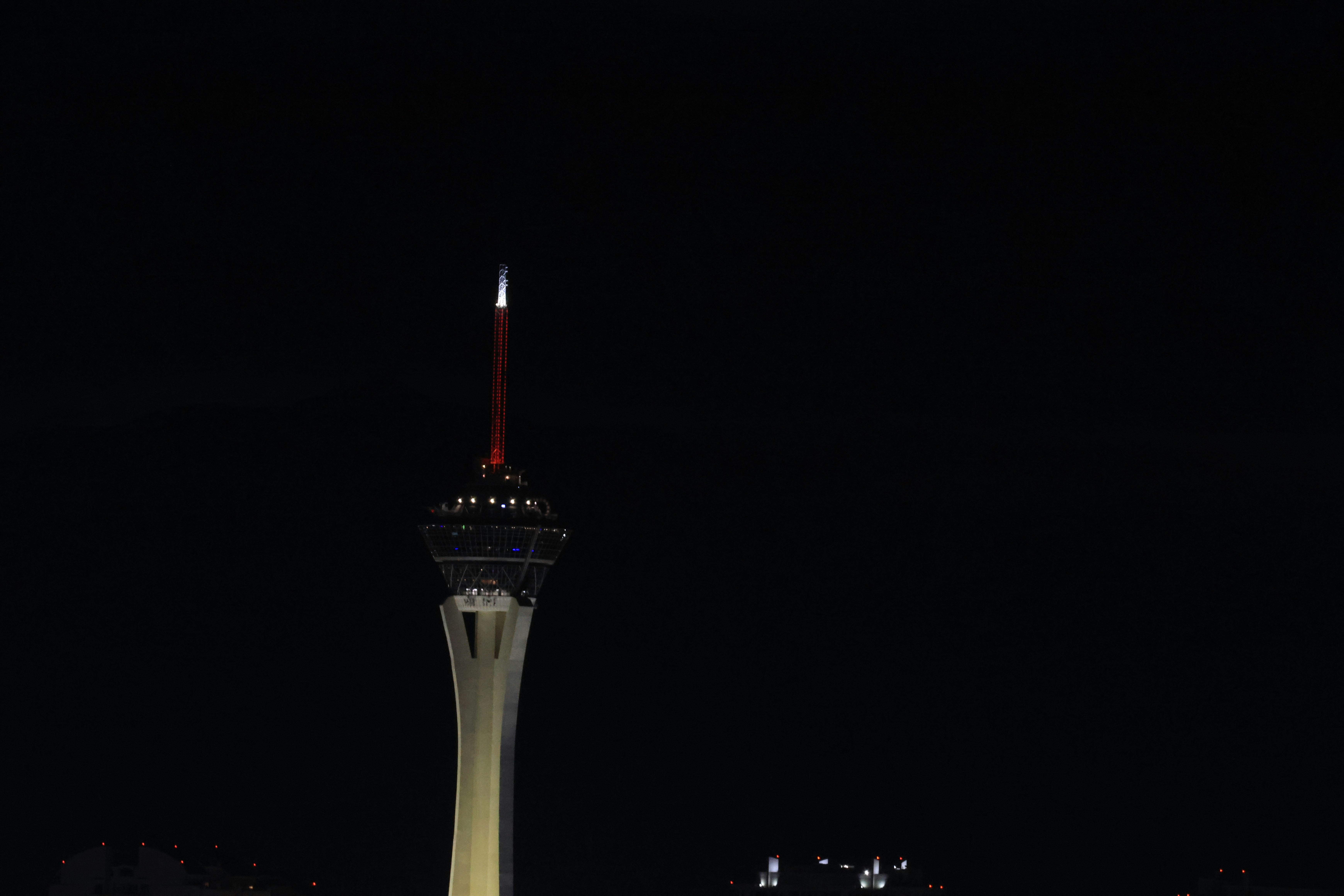 Towered Night Sentinel: A Quiet Skyline Under Dark Sky